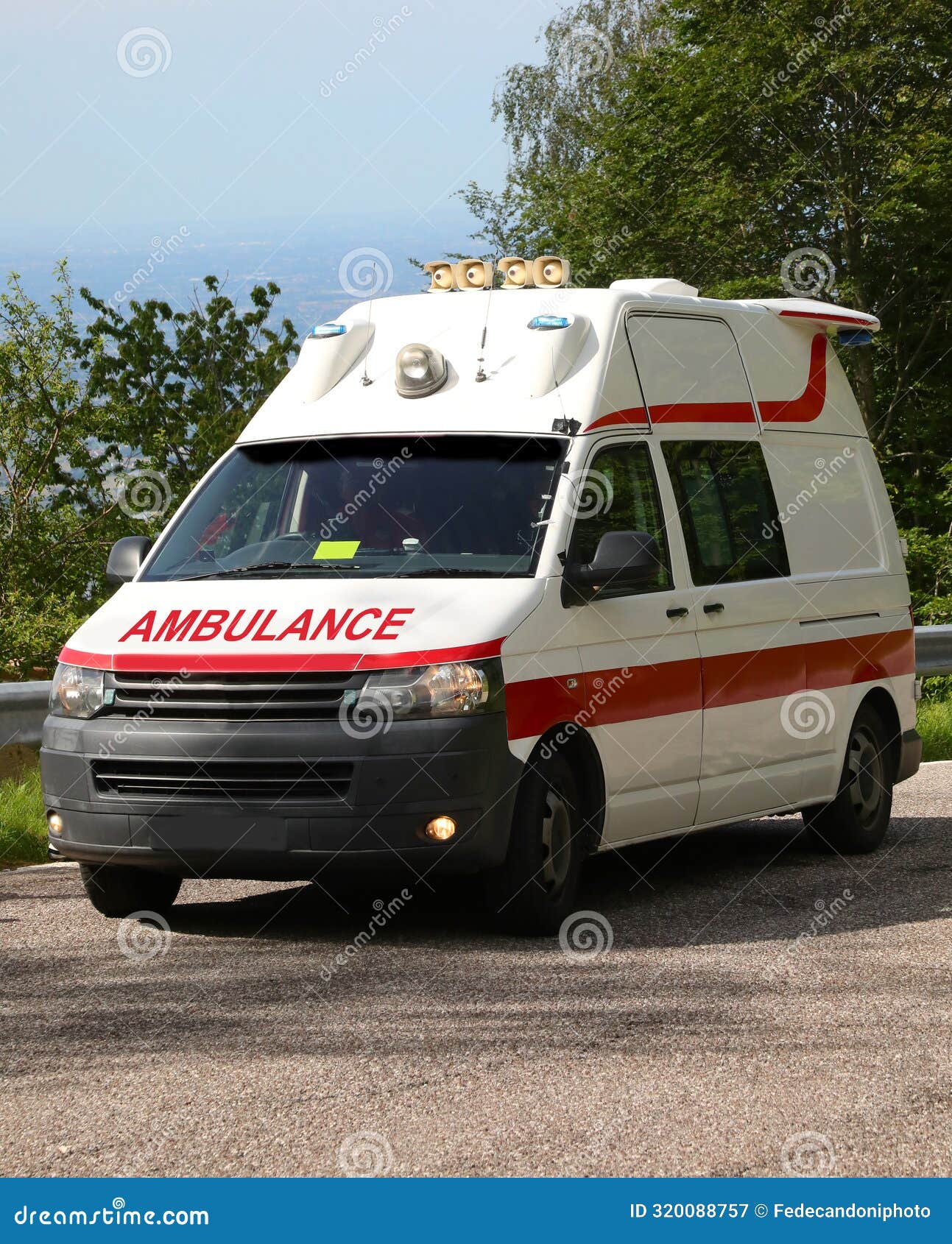 Ambulance Van with Big Text while Responding To an Emergency on the ...