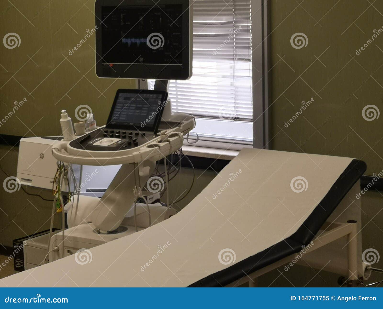 Ambulatory Hospital with Cot and Examination Machine Stock Image ...