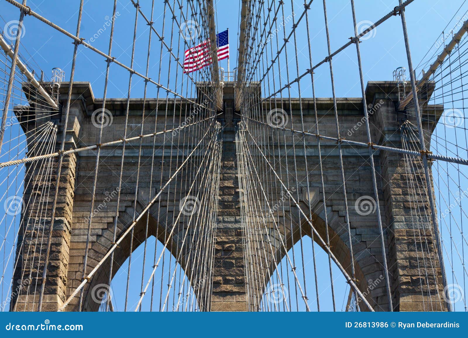 America Flag Flying Over the Brooklyn Bridge Stock Photo - Image of ...