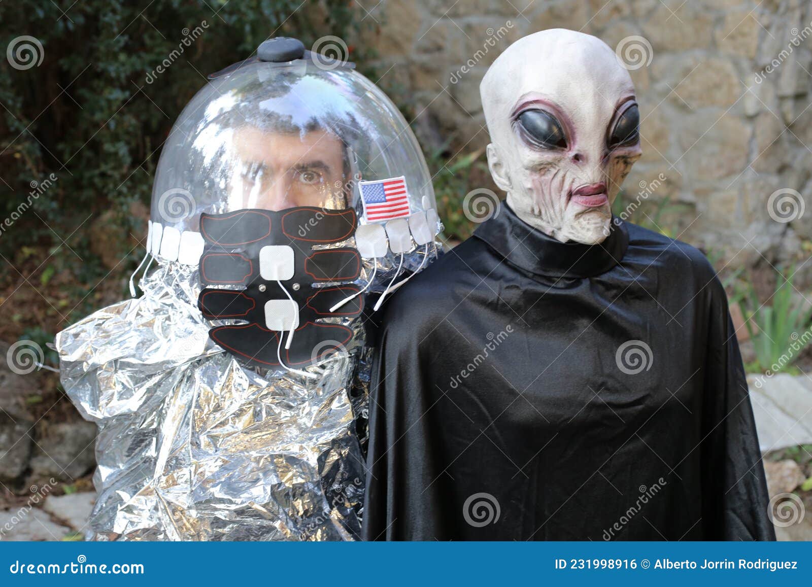 American Astronaut with an Alien Stock Photo - Image of invasion ...