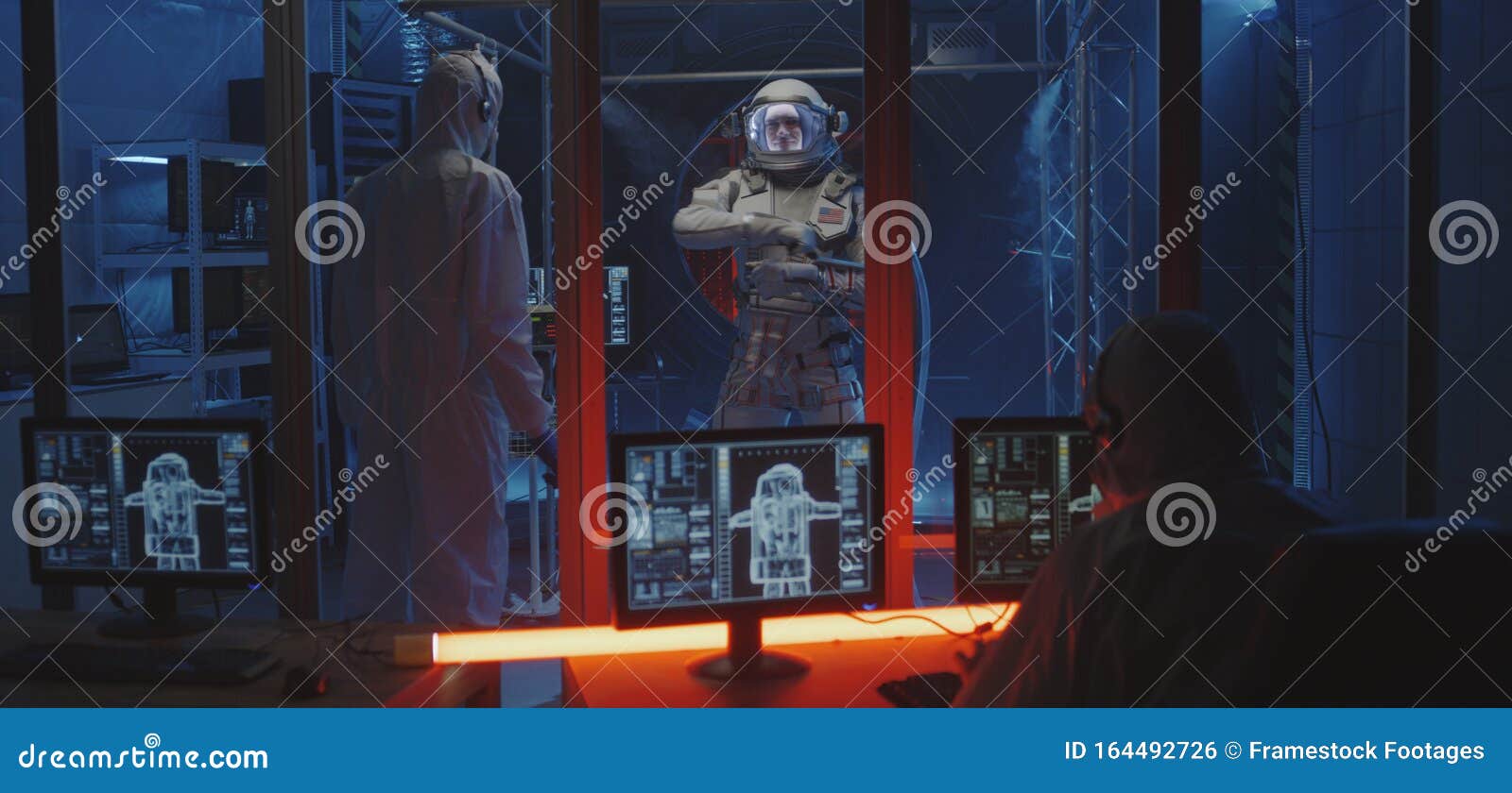 American Astronaut Testing Spacesuit Mobility Stock Photo - Image of ...