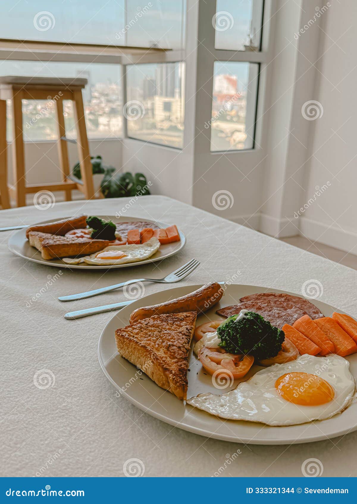 American Breakfast Sets of Fried Eggs, Toasts, Carrots and Hams on ...