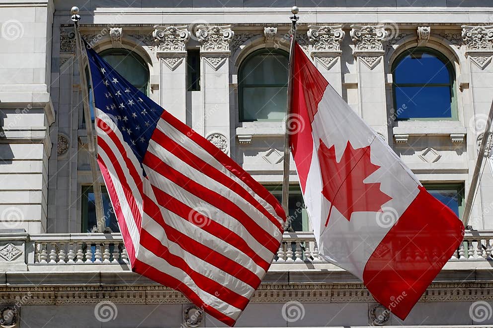 American and Canadian Flags Stock Photo - Image of power, patriotism ...