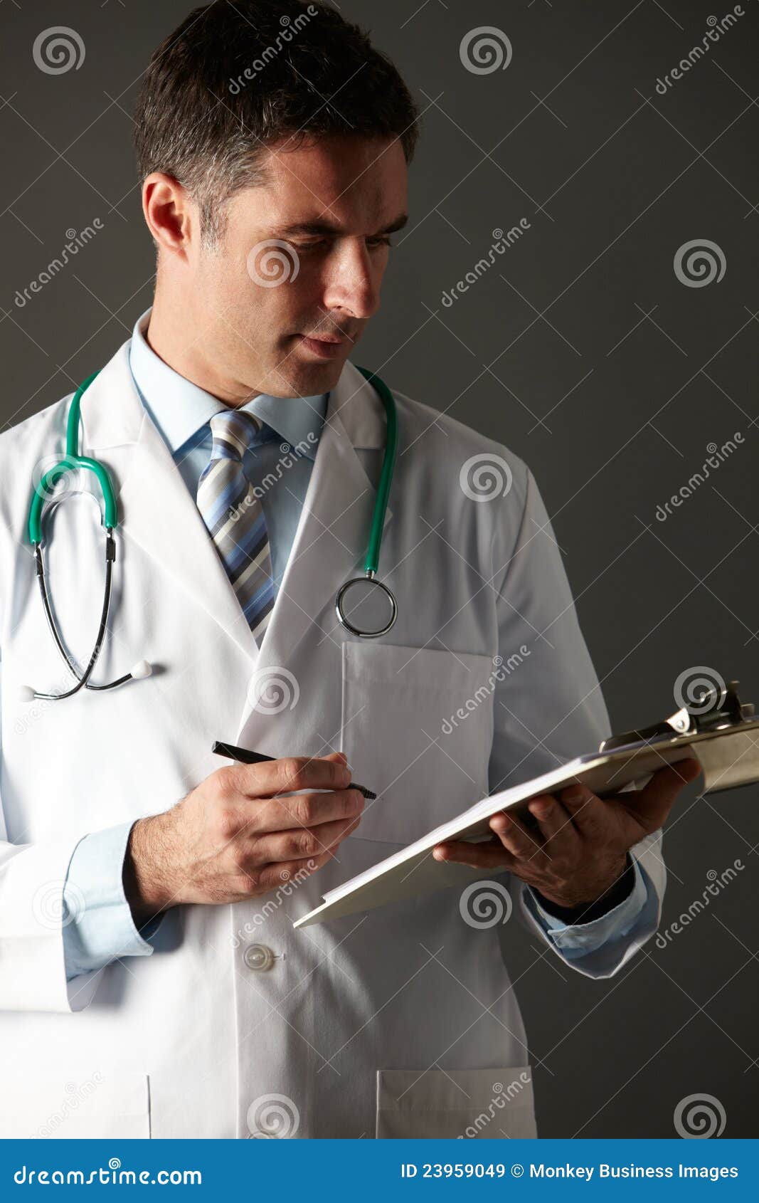 American Doctor Writing in His Clipboard Stock Image - Image of ...