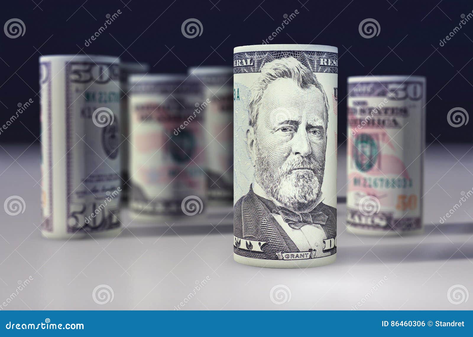 American 50 Dollars Greenback Rolled Up on the Black Stock Photo ...