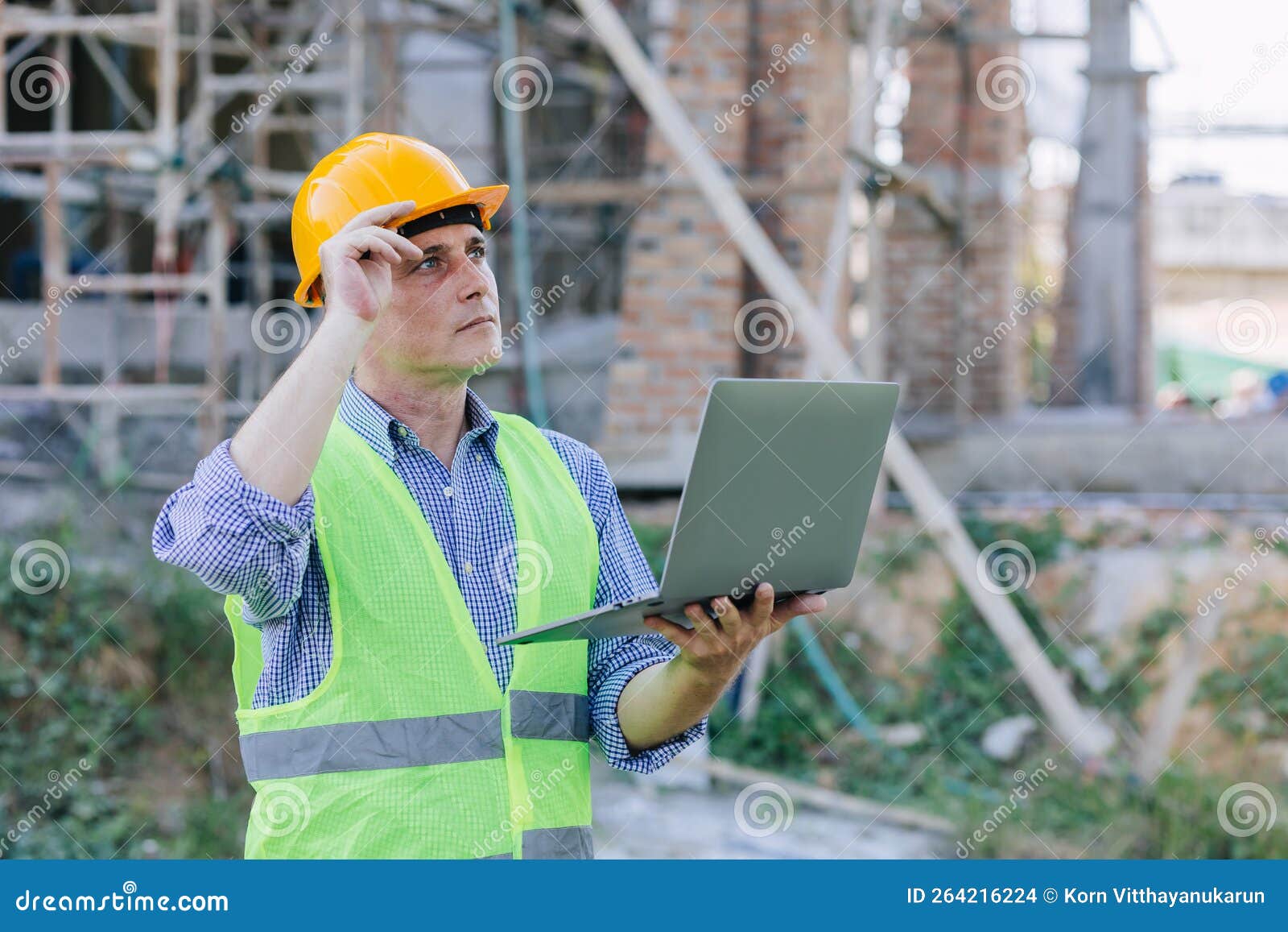 American Engineer Builder Work in Construction Site. Professional ...