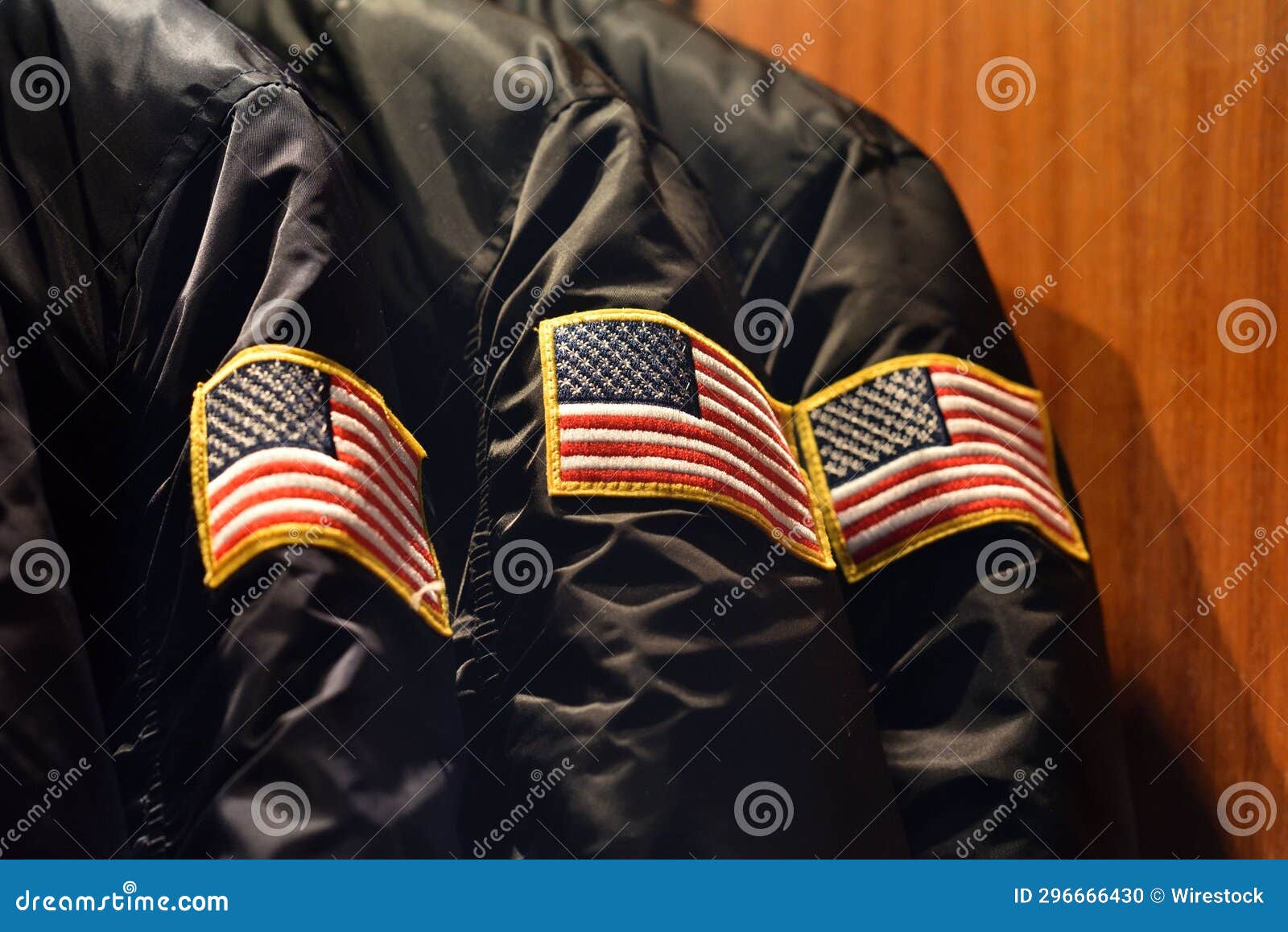 The American Flag is on the Back of the Jacket and on the Side of a ...