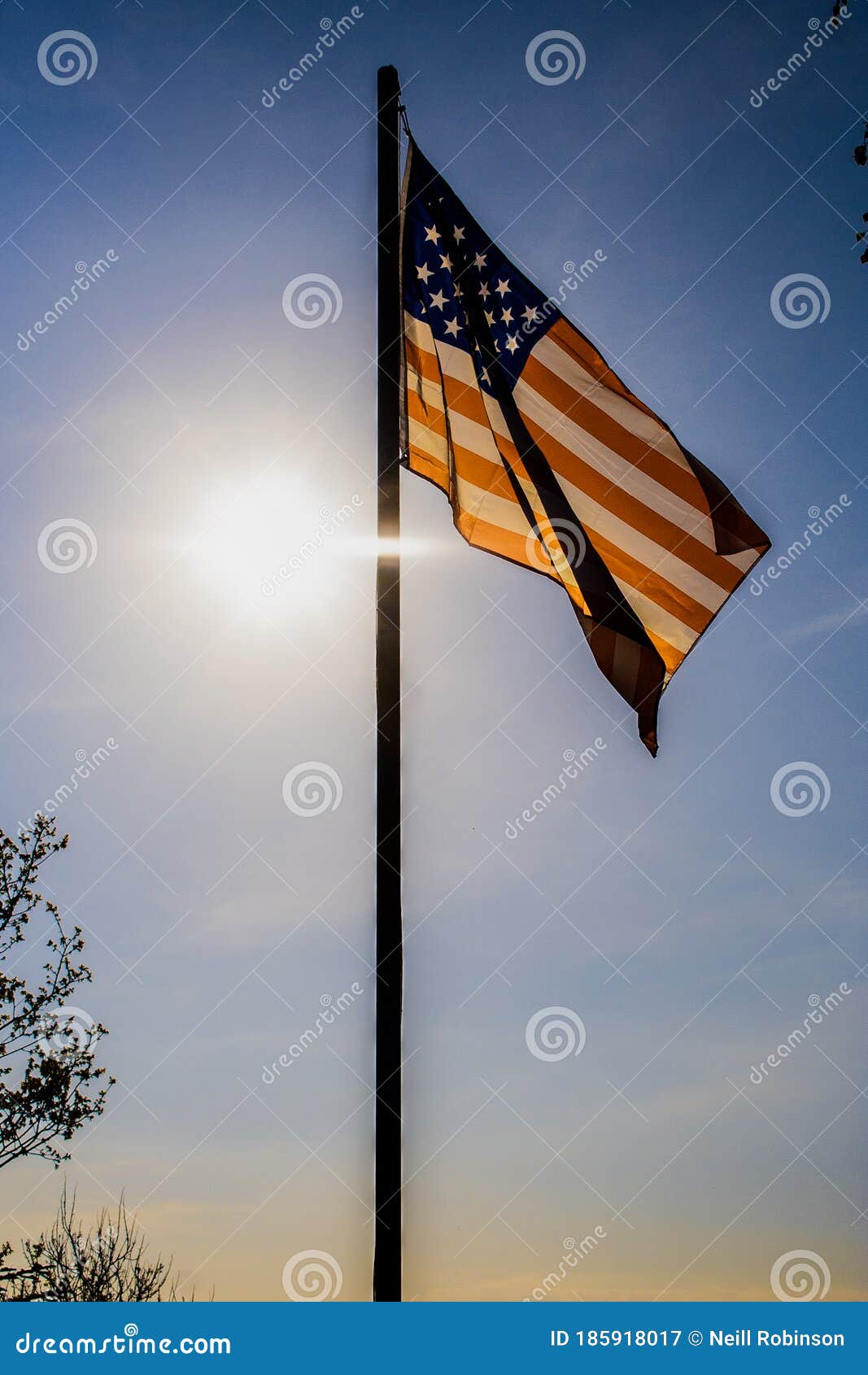 American Flag Back-lit by Sun on Flagpole Stock Image - Image of ...