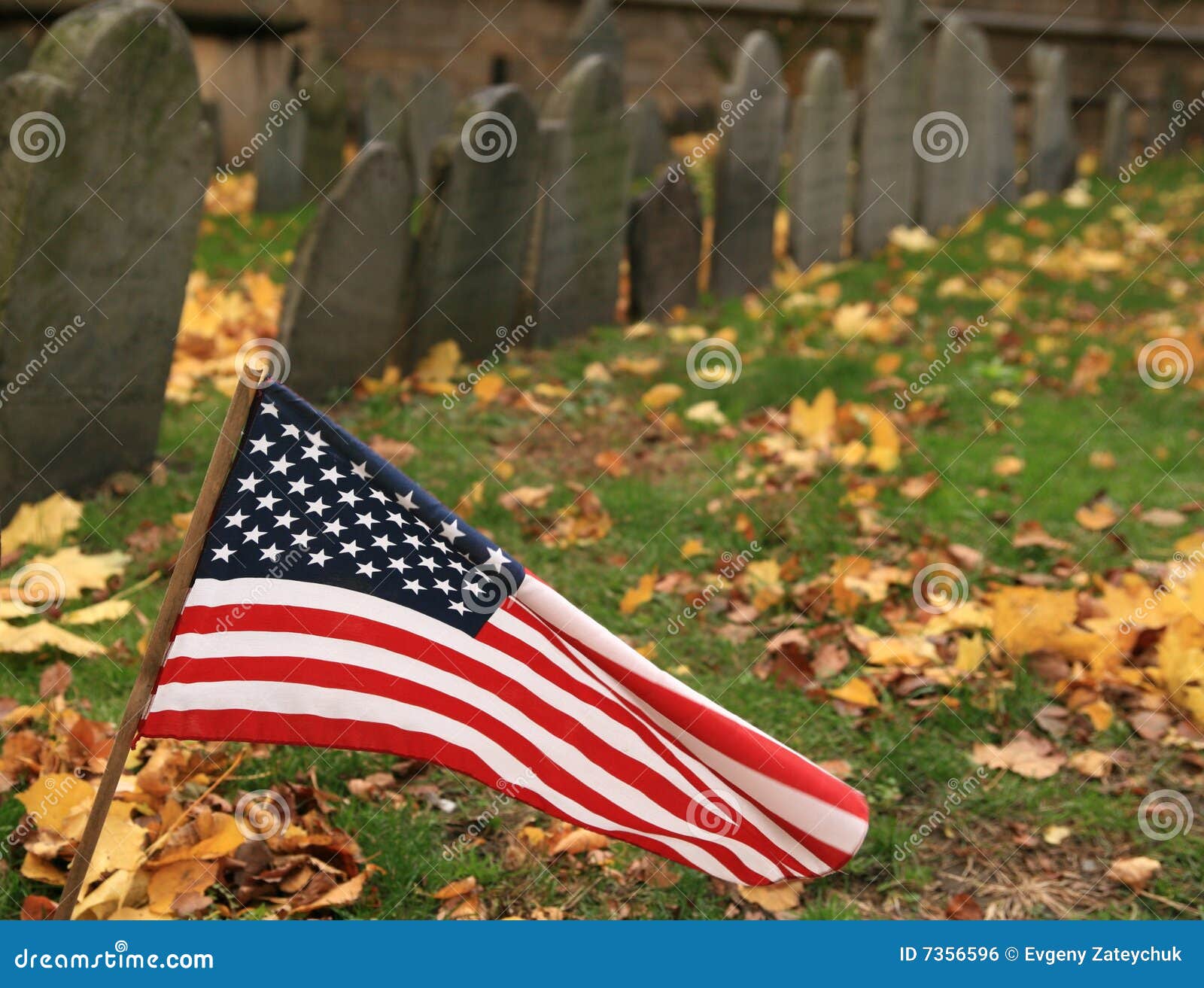 American Flag Beating in the Wind Against a Gravey Stock Photo - Image ...