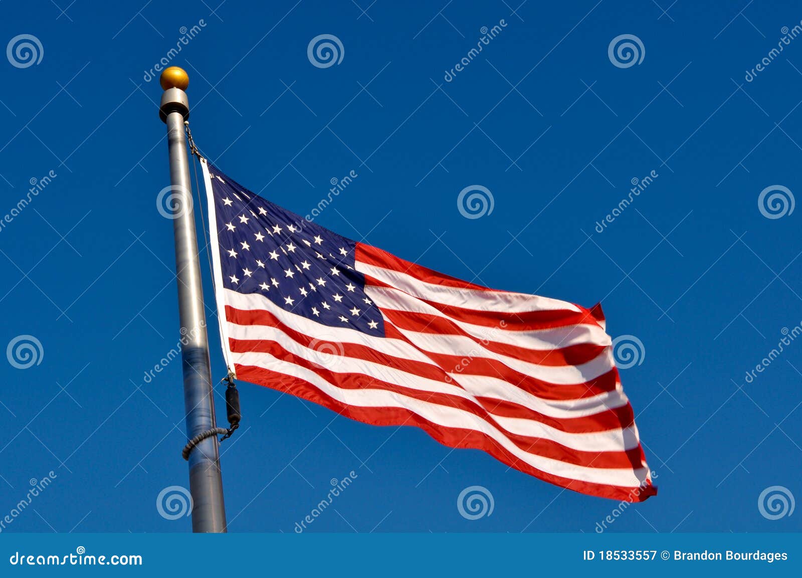 American Flag Blowing in Wind Stock Image - Image of liberty ...