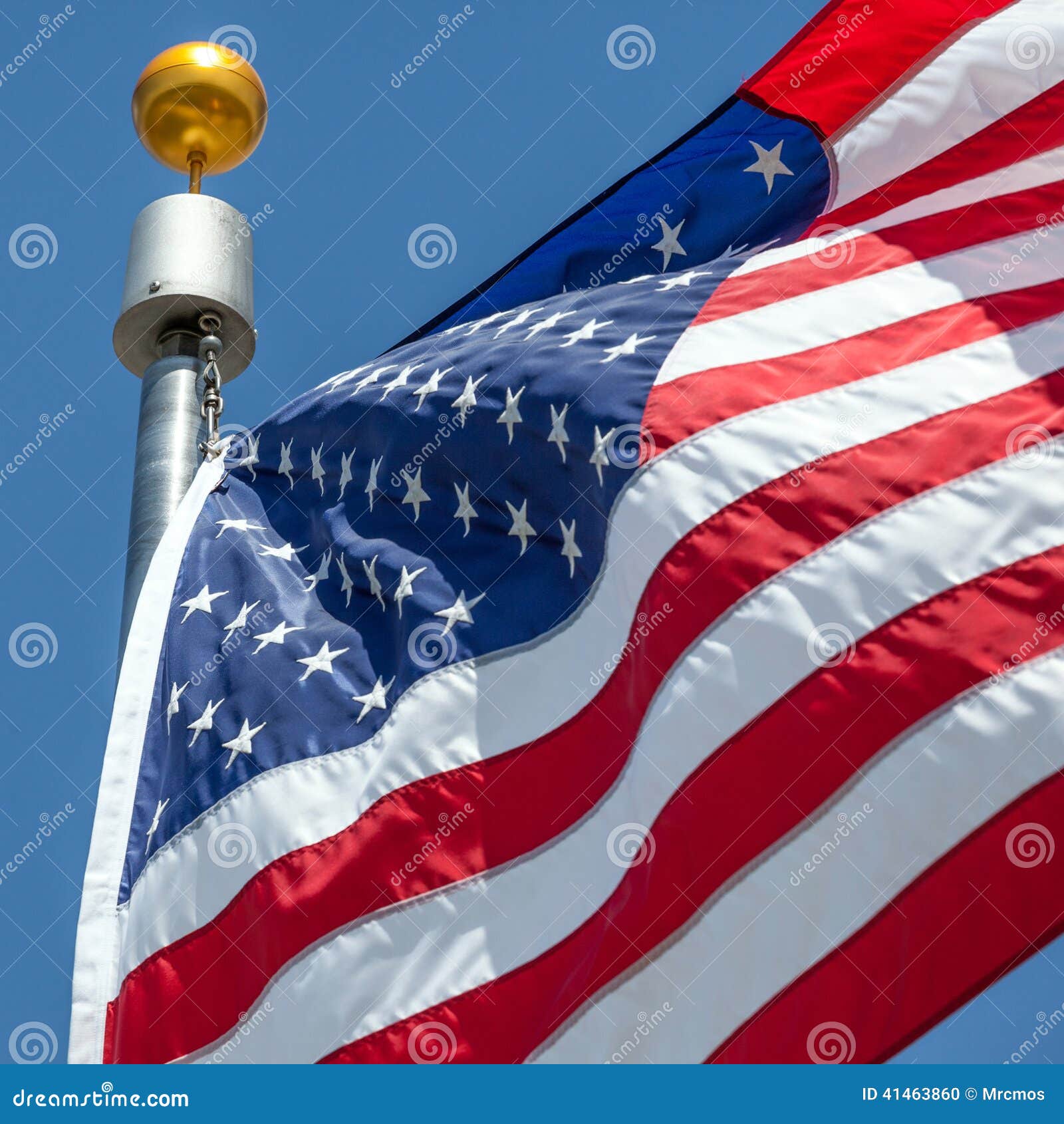 American Flag Blows in the Wind with Flag Pole Stock Photo - Image of ...