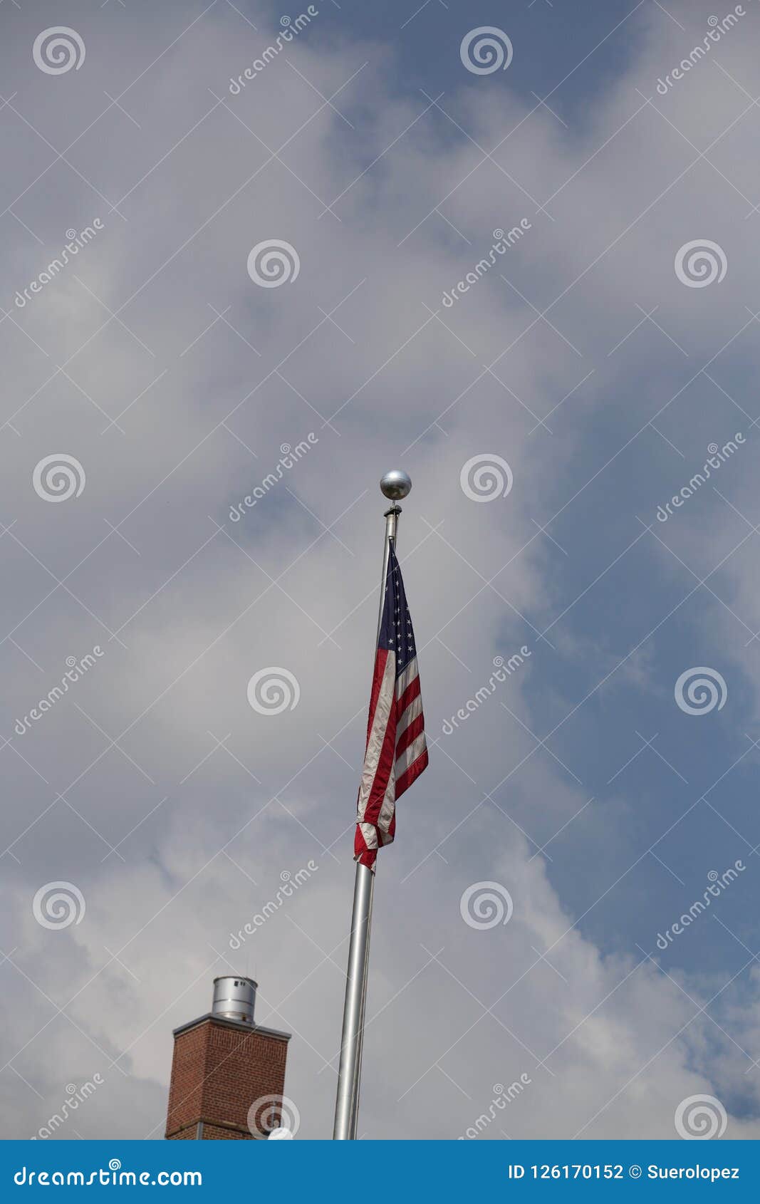 American Flag with Blue Sky on the Back Editorial Photography - Image ...
