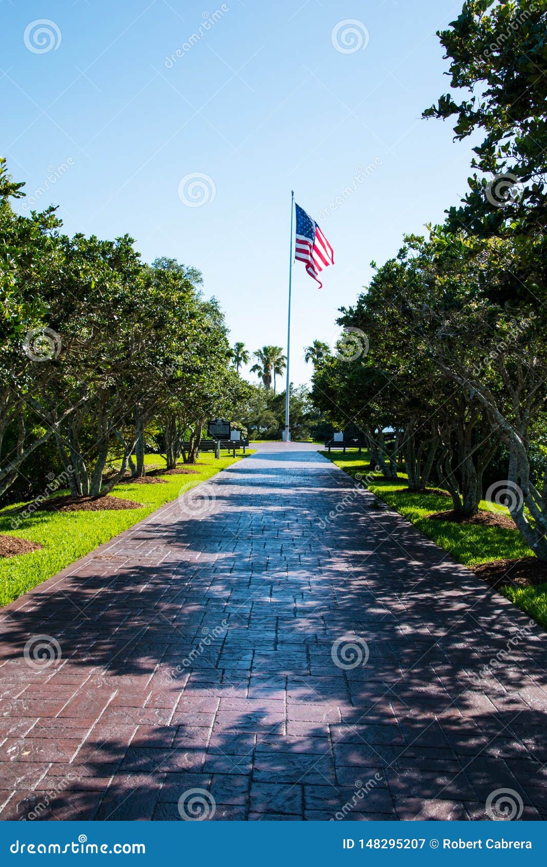 American Flag on a Brick Pathway Editorial Photography - Image of ...