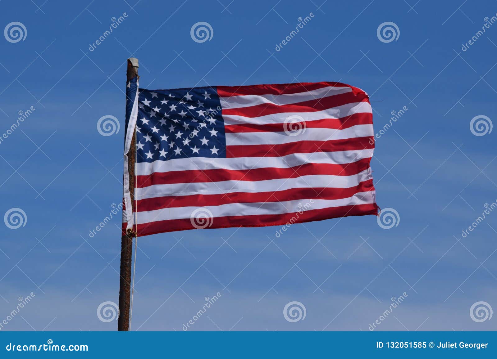 American Flag in a Bright Blue Sky Stock Image - Image of wind, brave ...