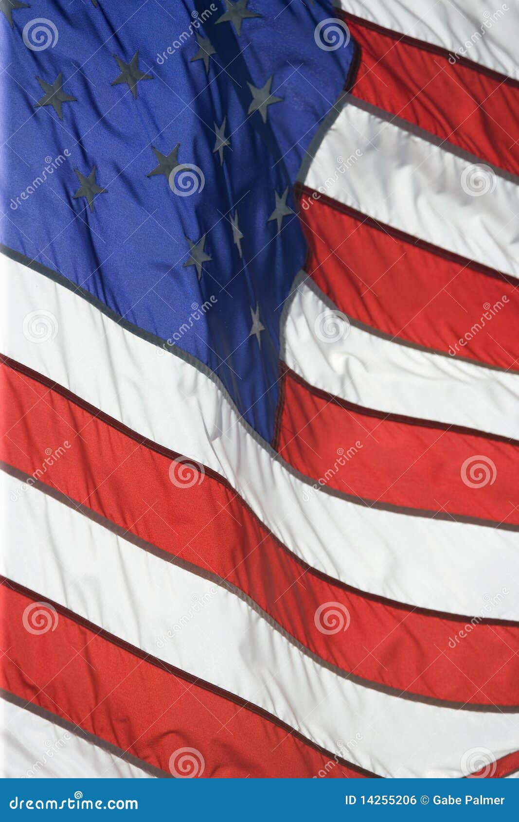 American Flag Flying Proudly on a Windy Day Stock Photo - Image of ...