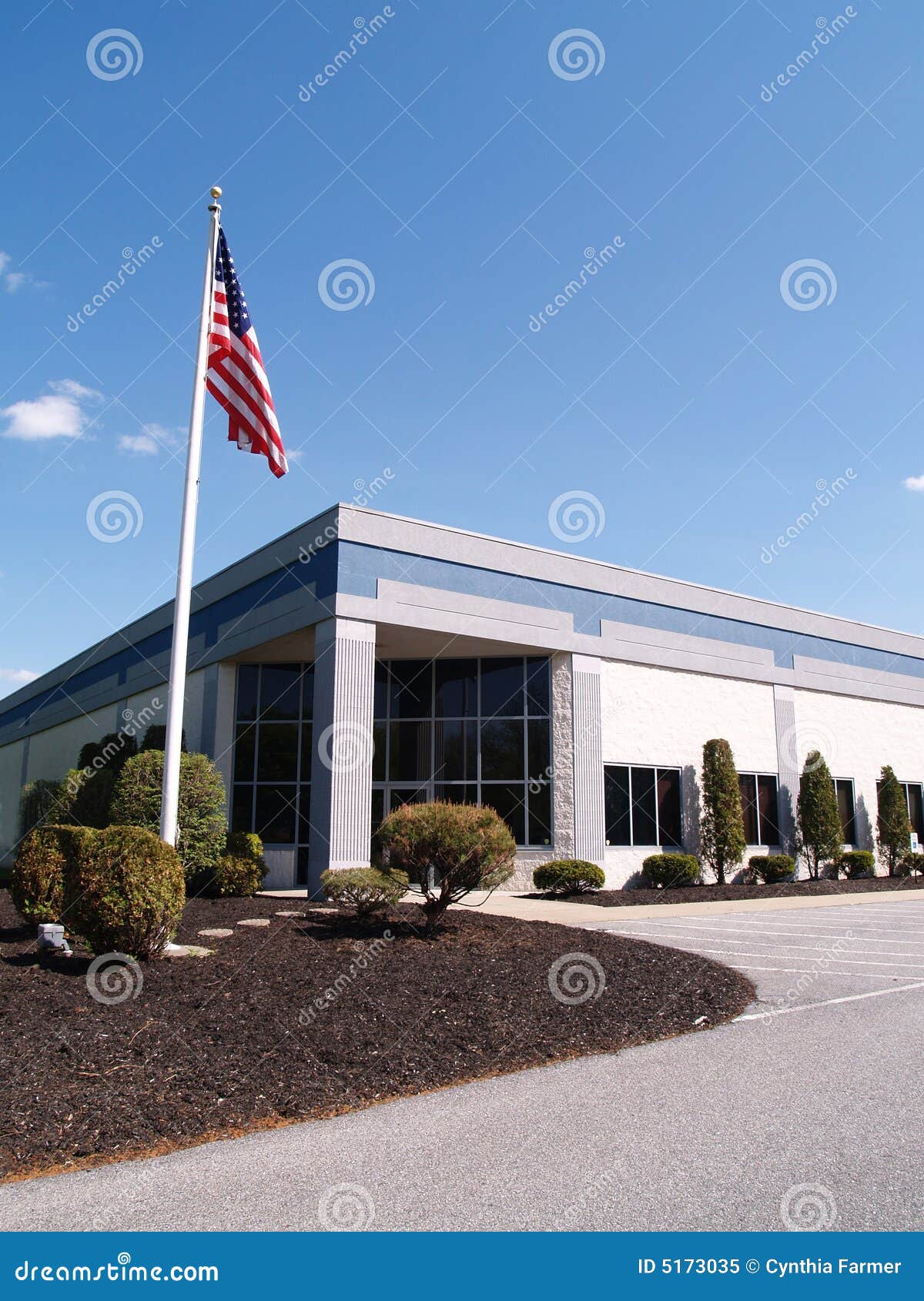 American Flag by a Modern Industrial Building Stock Image - Image of ...