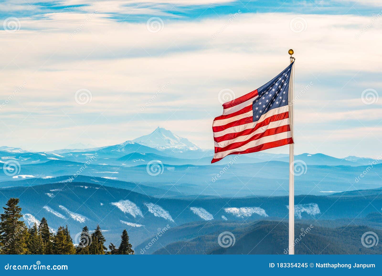 American Flag Over the Peak of Snow Mountain Stock Image - Image of ...