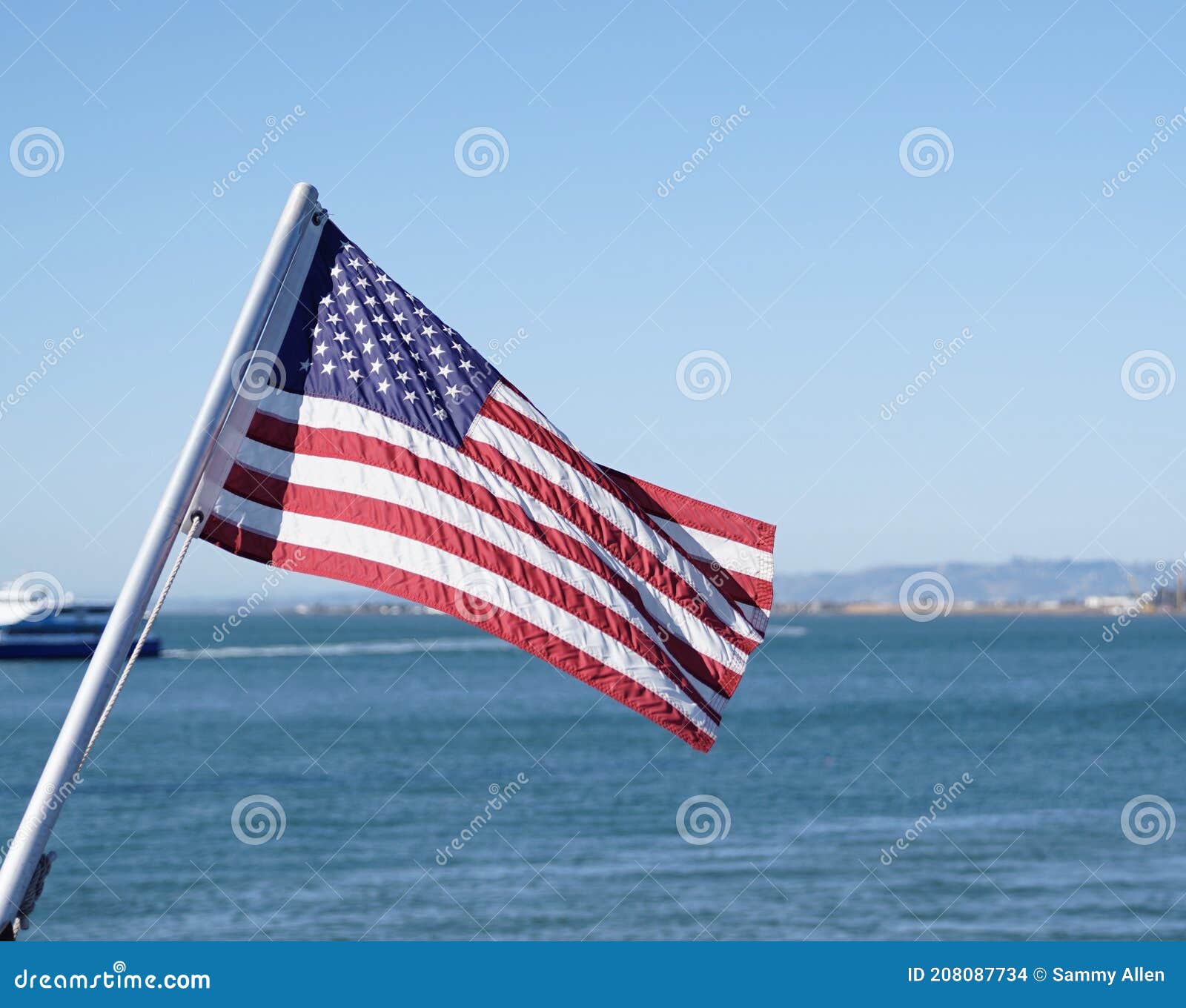 American Flag over the sea stock photo. Image of tower - 208087734