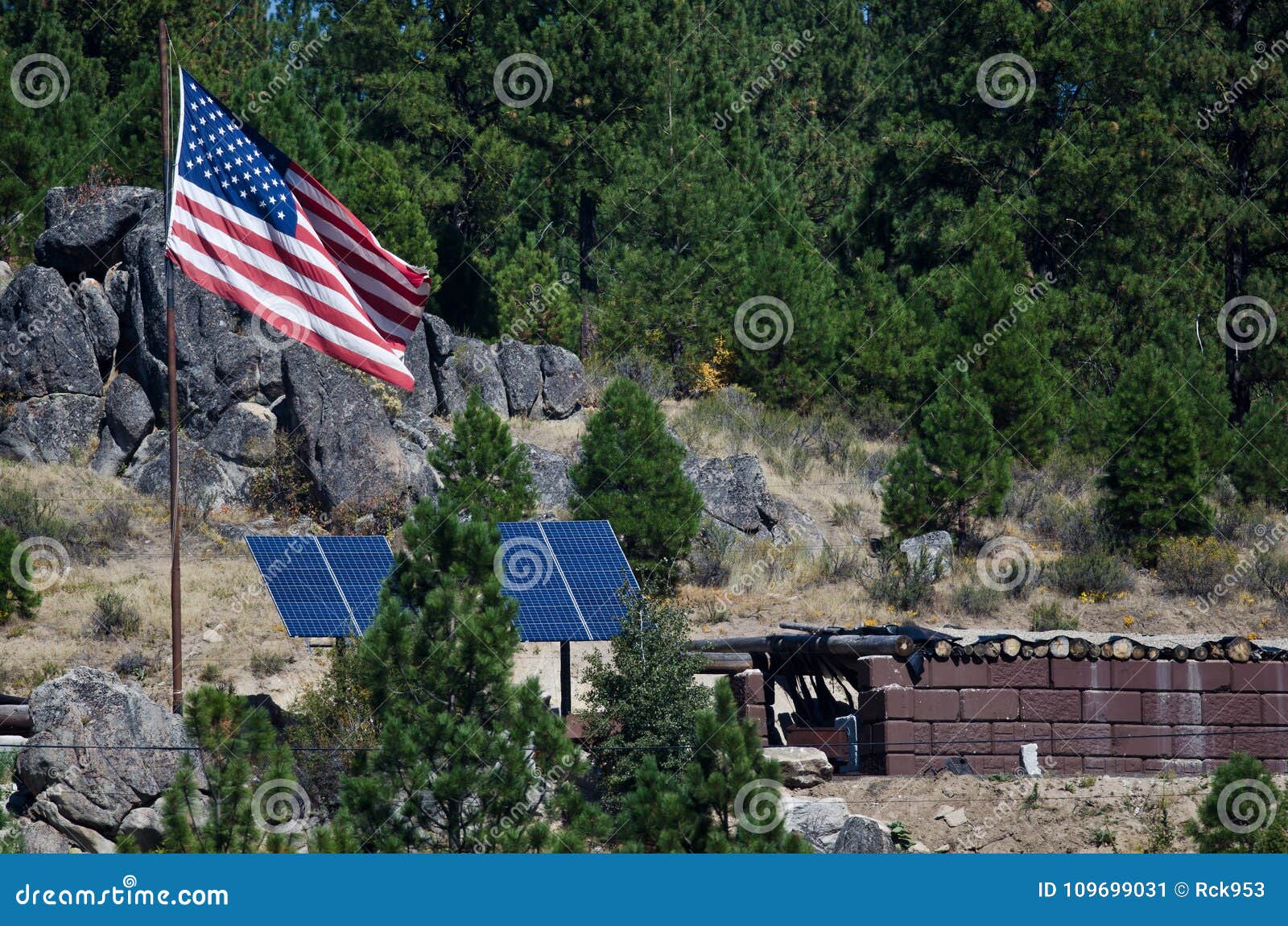 American Flag Standing Above Remote Outpost in the Wilderness Stock ...