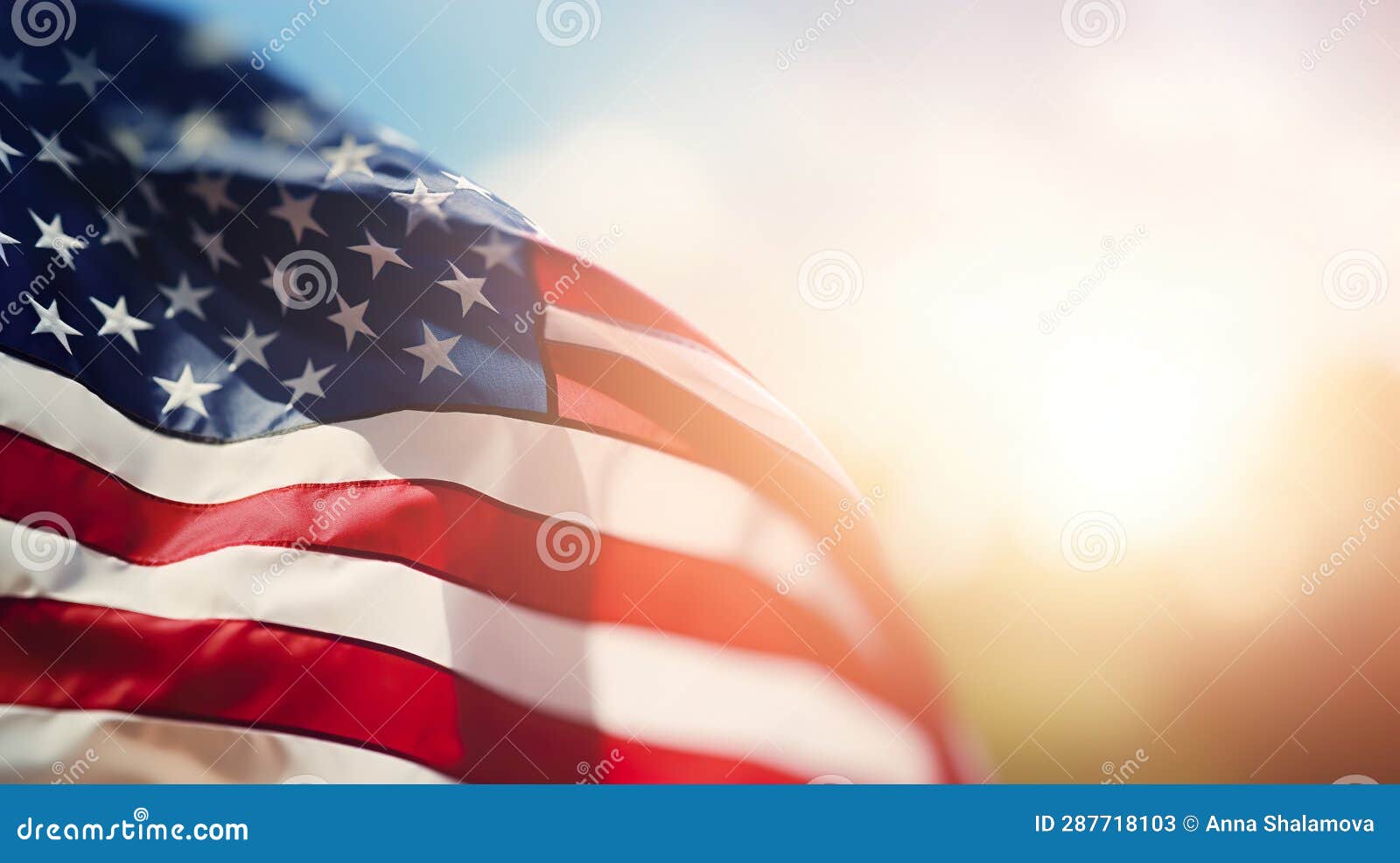 American Flag Waving in the Wind in the Rays of the Sun Stock ...