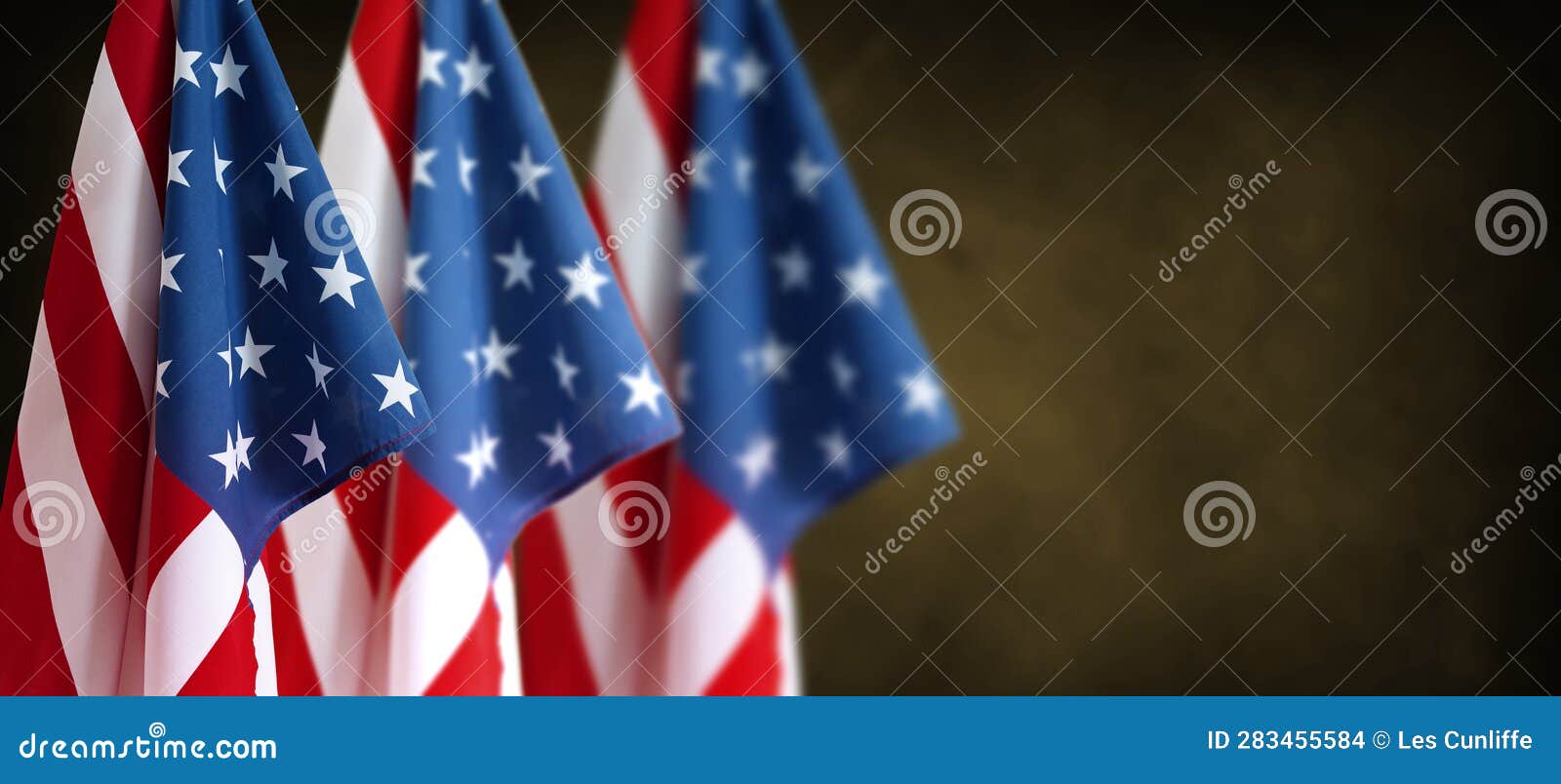 American Flags in Front of Brown Background Stock Photo - Image of ...