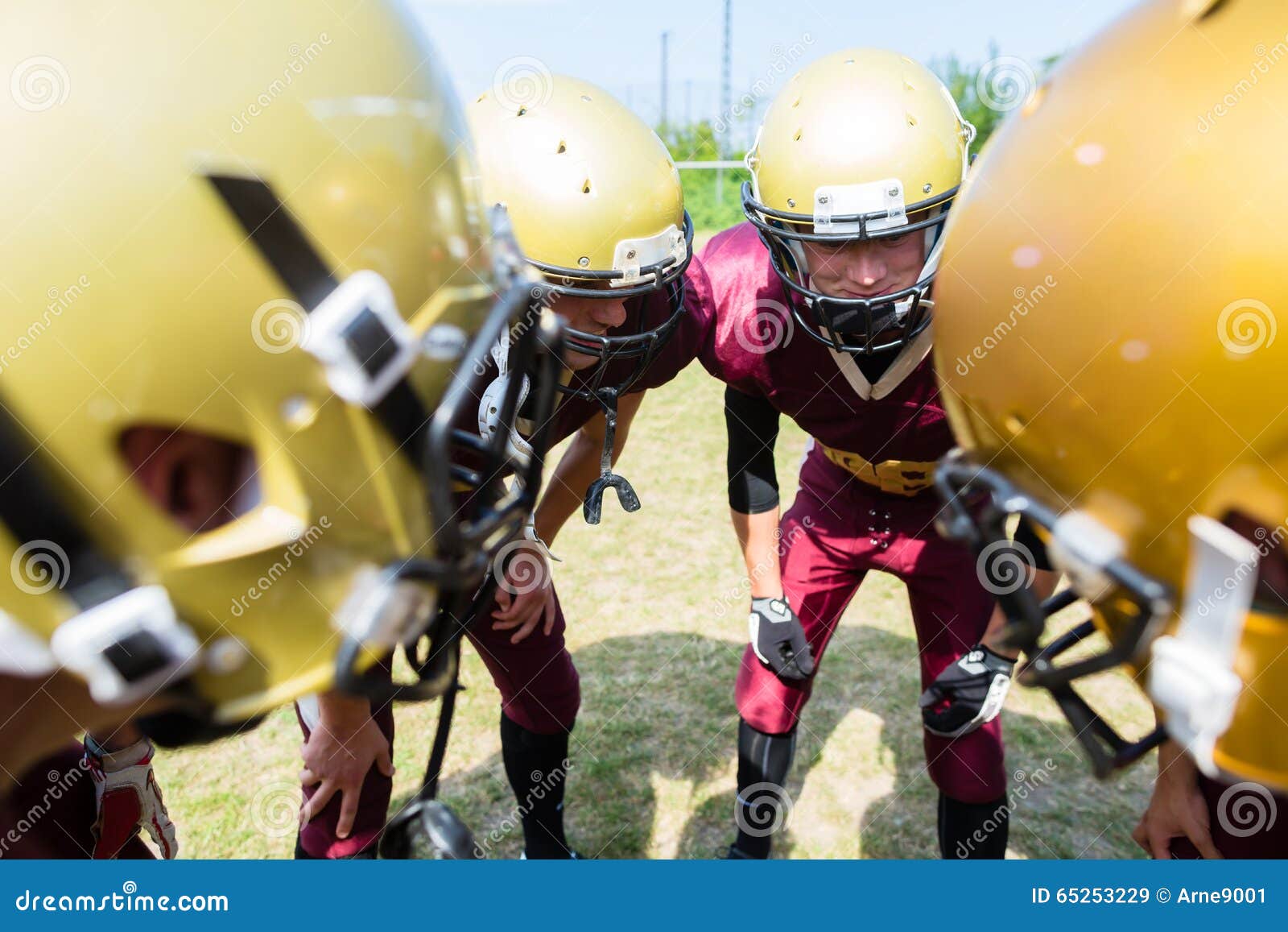 American Football Players at Strategy Huddle Stock Image - Image of ...