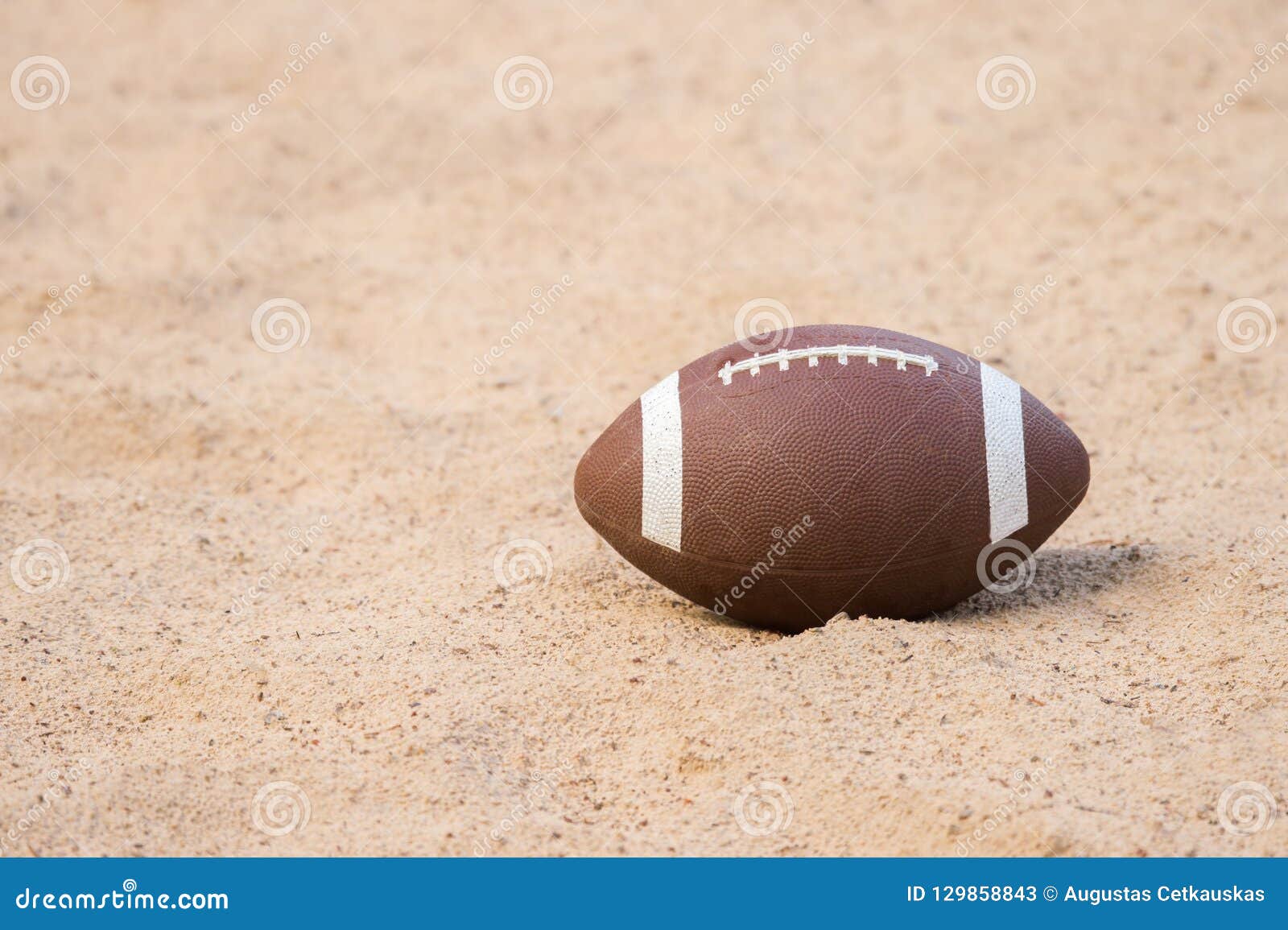American Football in the Sand on the Beach Stock Image - Image of loser ...