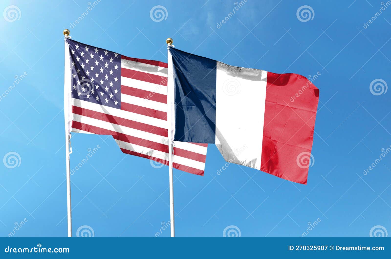 American and French Flags on Cloudy Sky. Waving in the Sky Stock ...