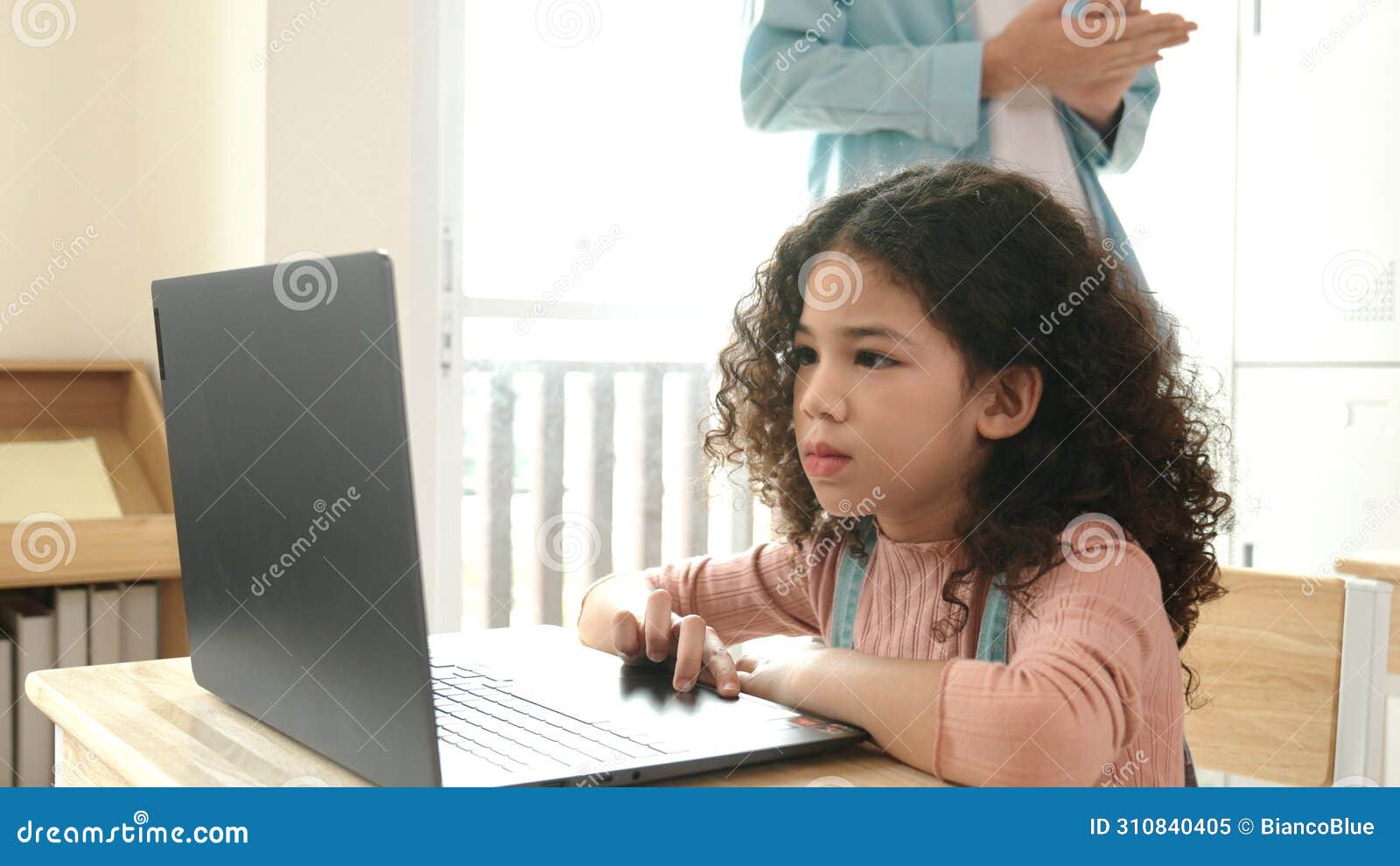 American Girl Learning about Prompt while Student Sitting at Class ...