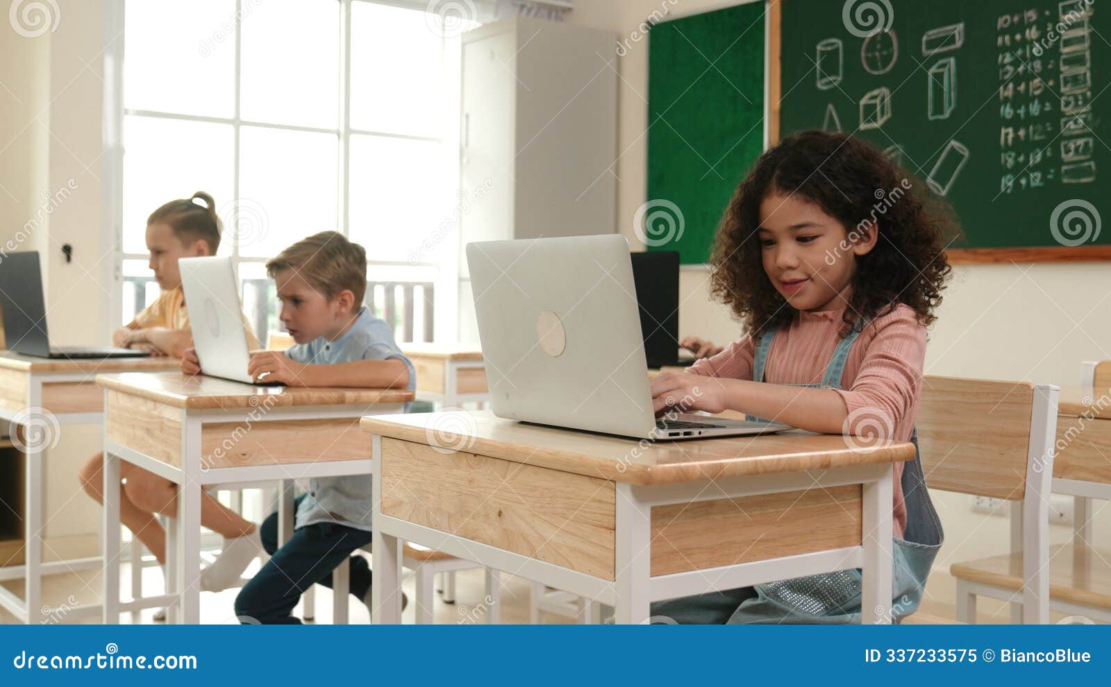 American Girl Learning about Prompt while Student Sitting at Class ...