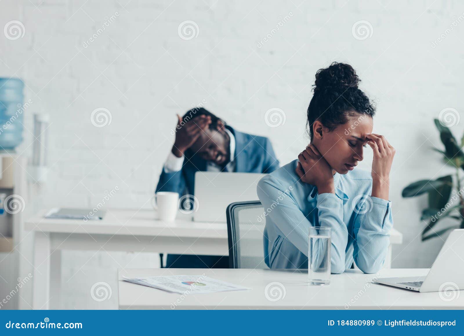 American Managers Sitting at Workplaces and Suffering from Headaches ...