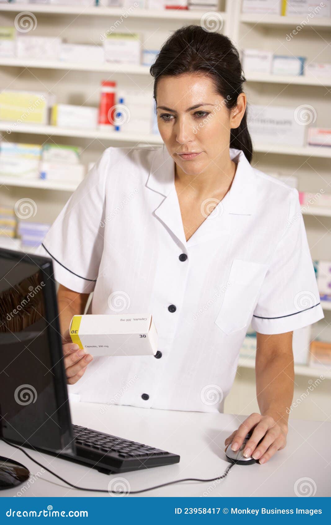 American Pharmacist Using Computer in Pharmacy Stock Image - Image of ...