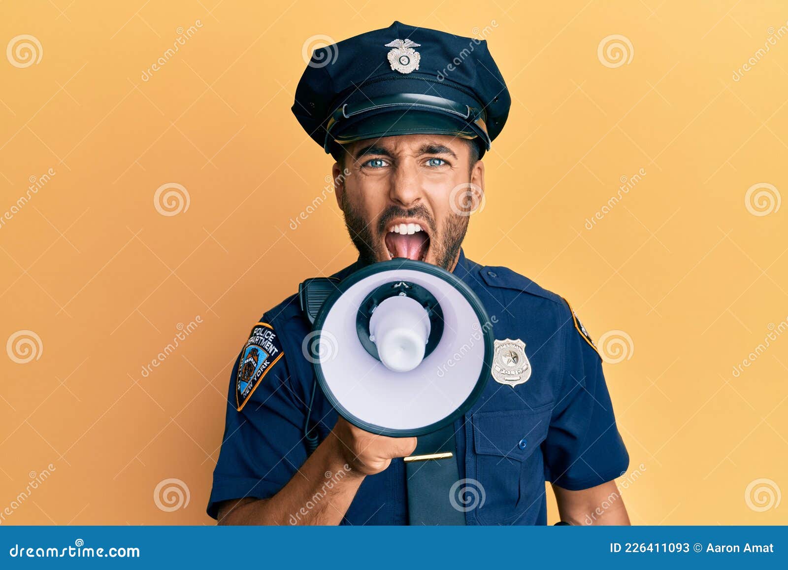 American Police Officer Shouting through Megaphone, Yelling and ...