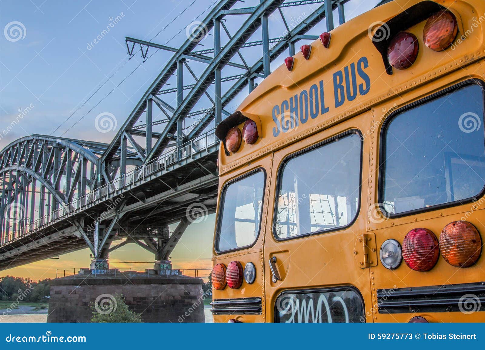 American School Bus in Front of a German Bridge Stock Image - Image of ...