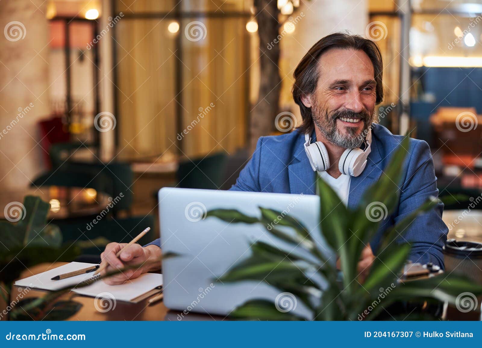 Friendly Gentleman Working Remotely from a Hotel Lounge Stock Image ...