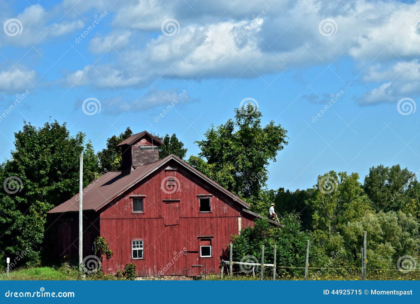 Man working on Barn stock image. Image of community, barns - 44925715