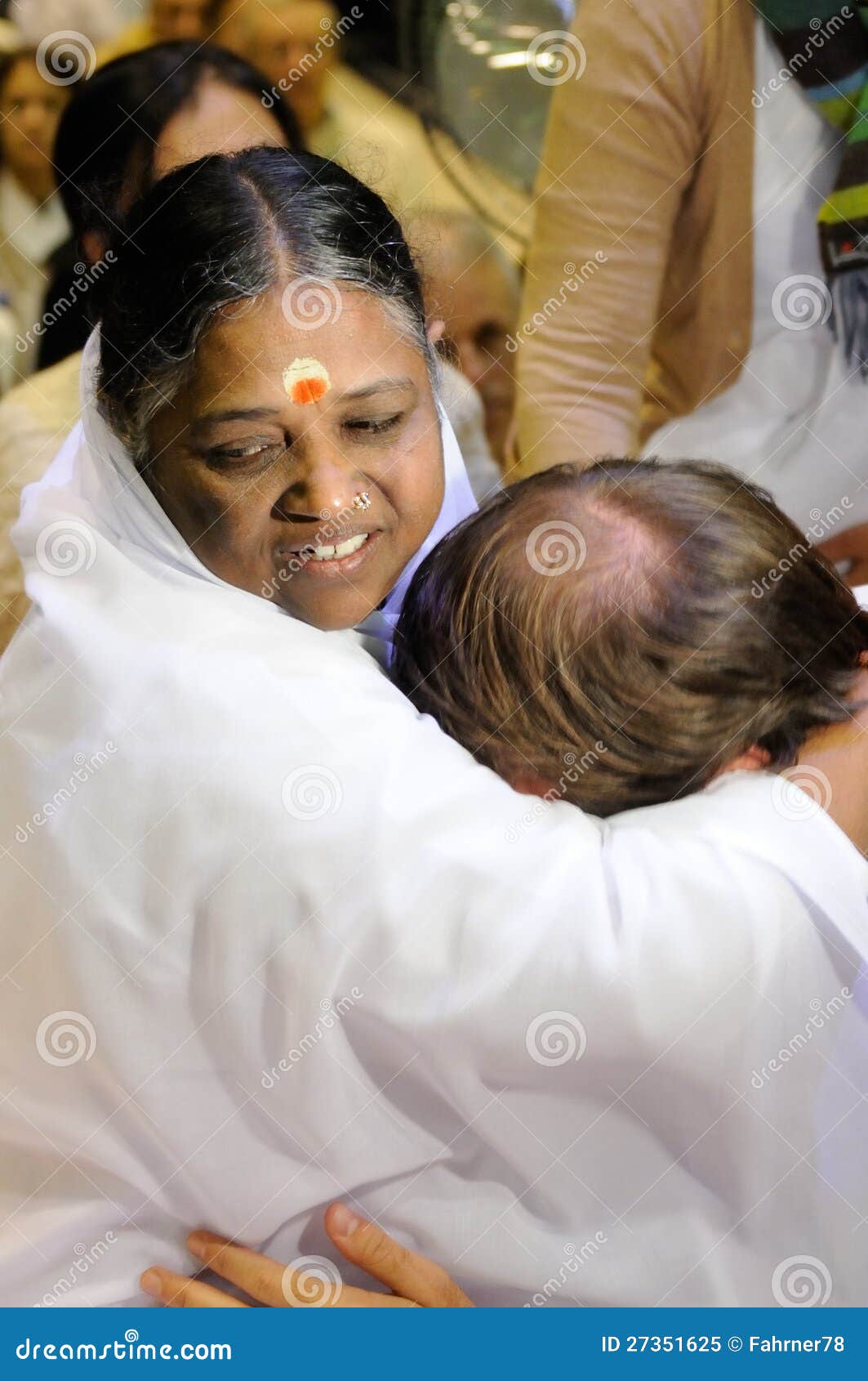 Amma Embracing the world editorial image. Image of female - 27351625