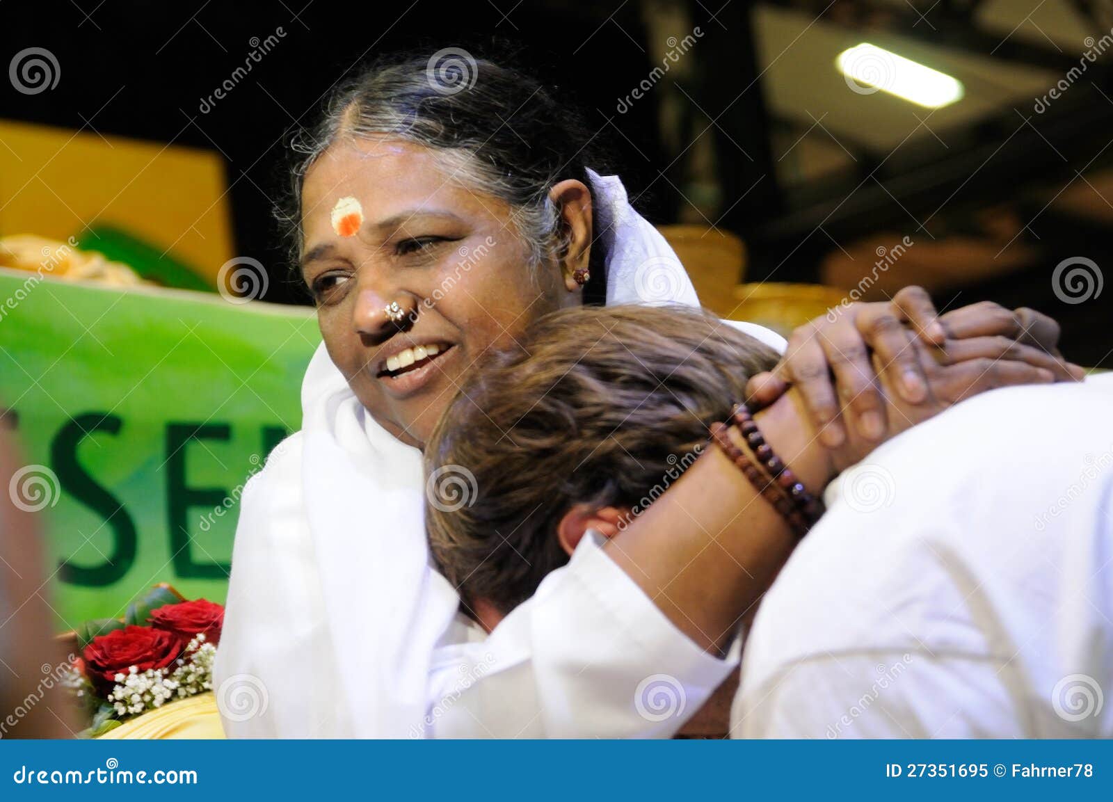 Amma Embracing the world editorial image. Image of amma - 27351695