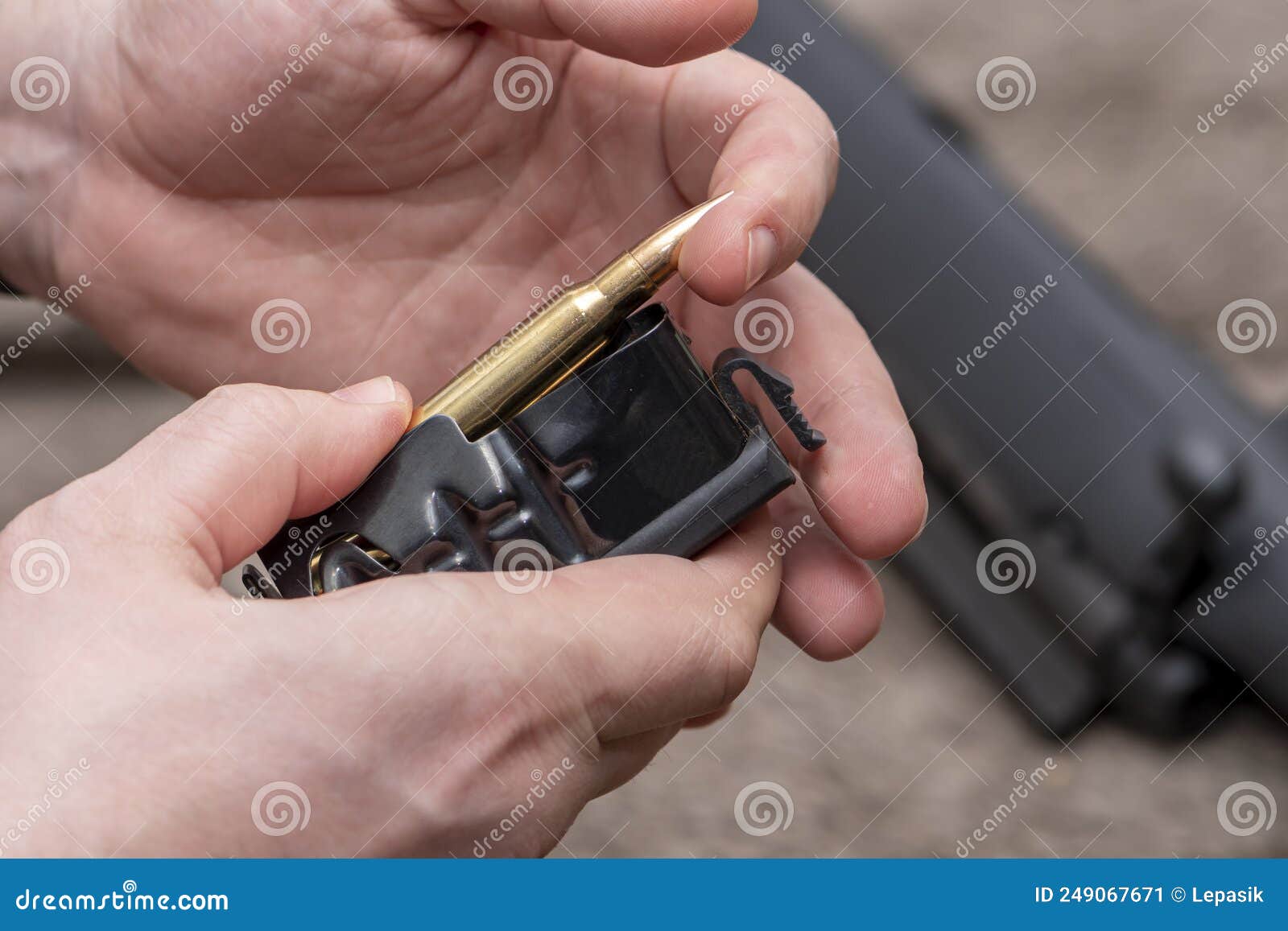 Ammunition for a Rifle with a Magazine, Loading Combat Weapons. Stock ...