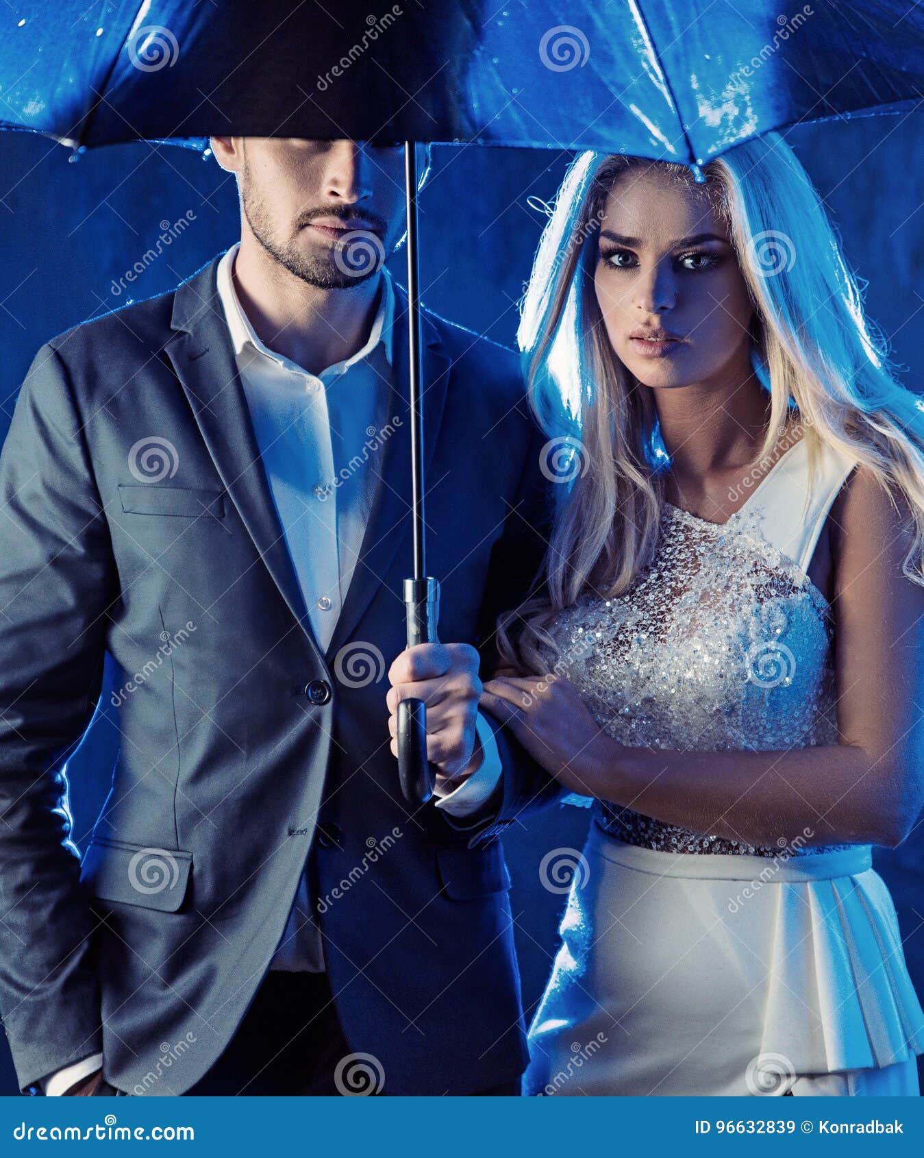 Amorous Couple Posing on a Rainy Bacground Stock Image - Image of ...