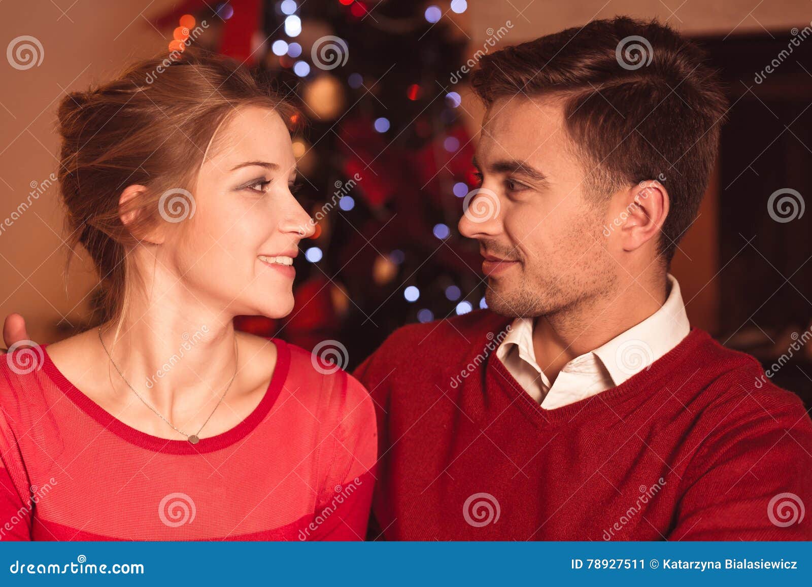 Amorous Couple in Red Clothes Stock Image - Image of husband, women ...