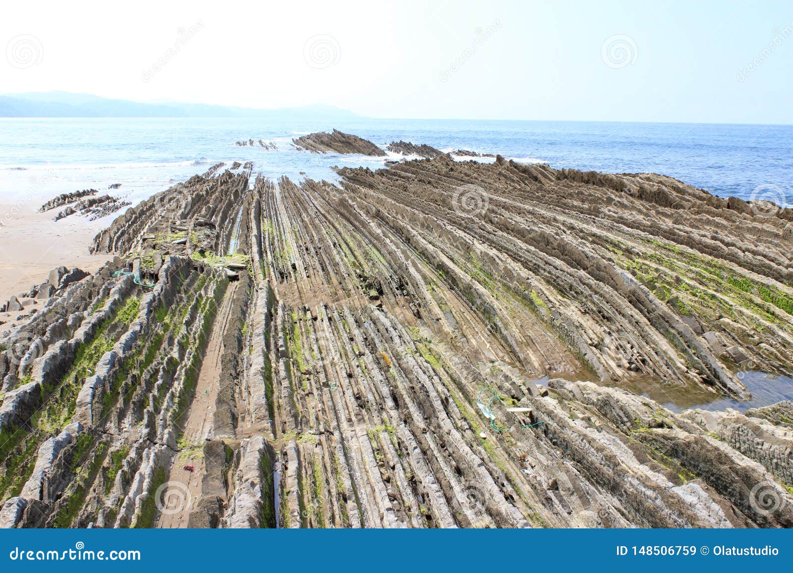 Sharp Rocks in the Beach Under the Sun Stock Image - Image of beach ...