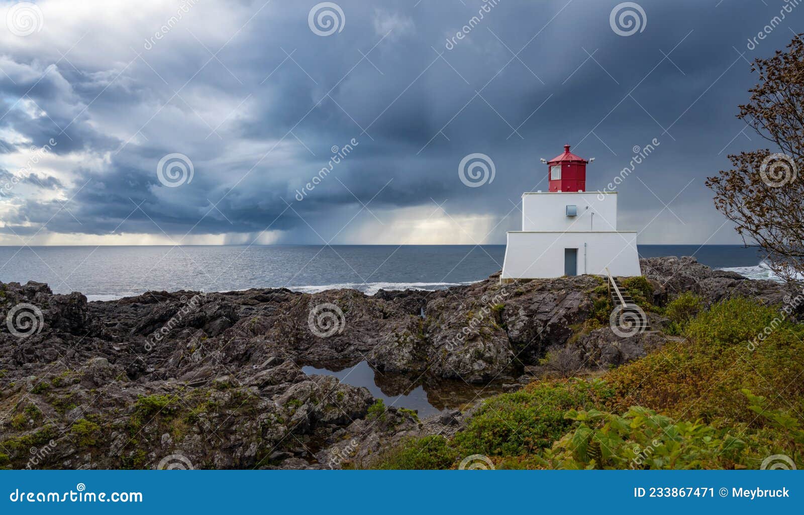 Amphitrite Point Lighthouse and Storm Clouds Stock Image - Image of ...