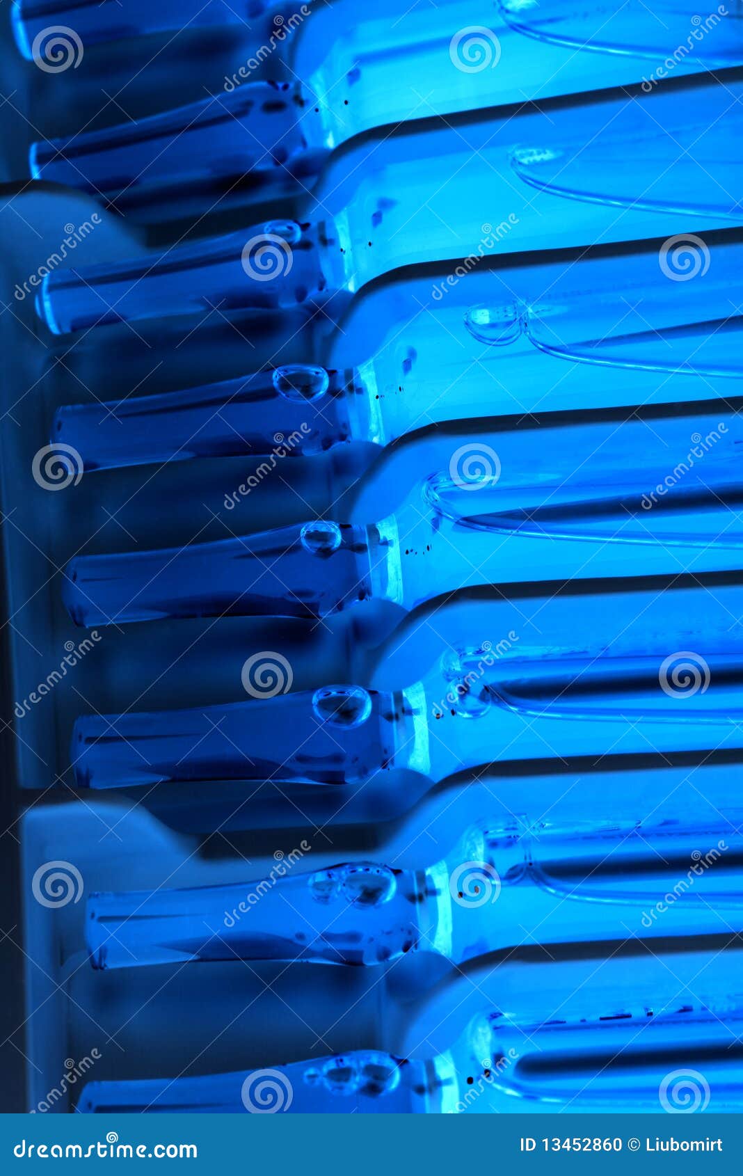Ampoules in Ultra-violet Light Stock Photo - Image of details, macro ...