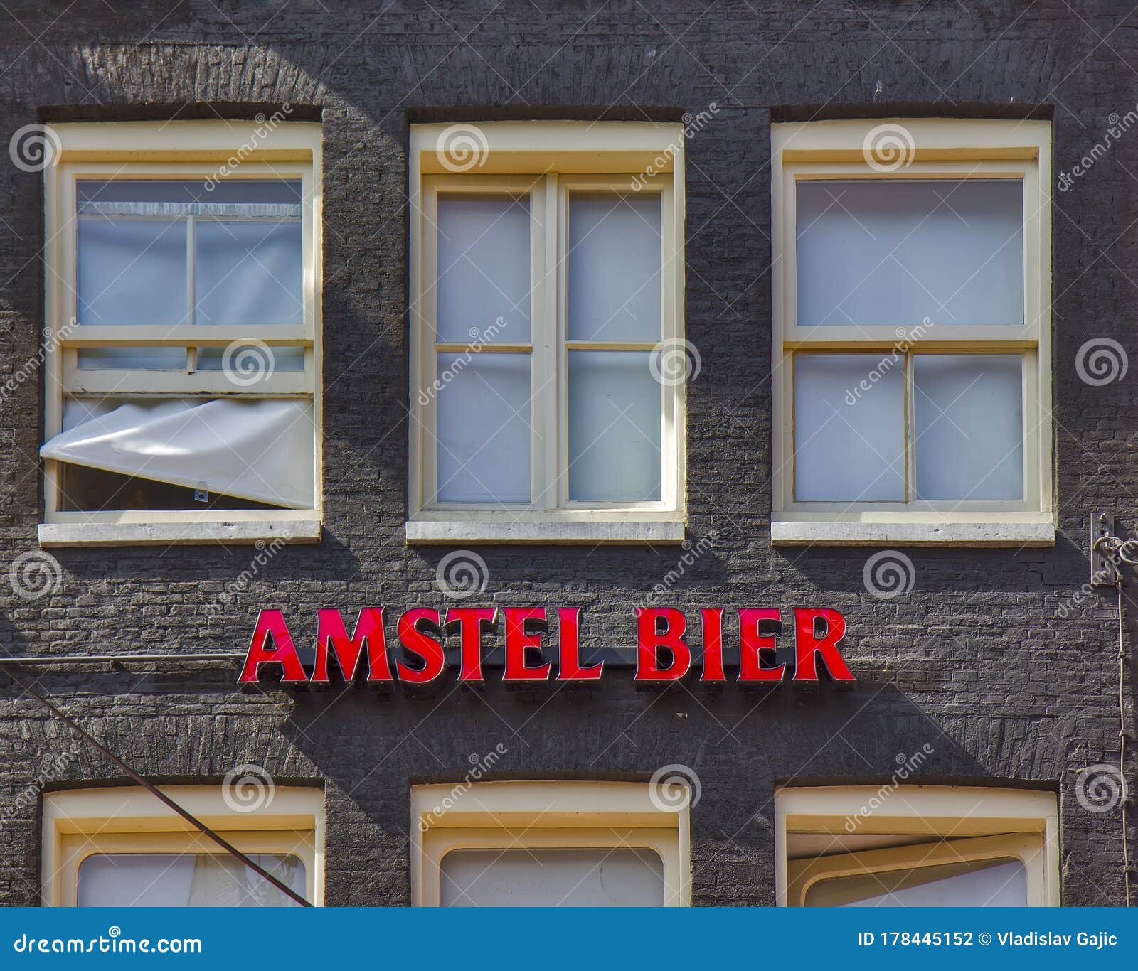 Amstel sign in Amsterdam editorial photography. Image of beautiful ...