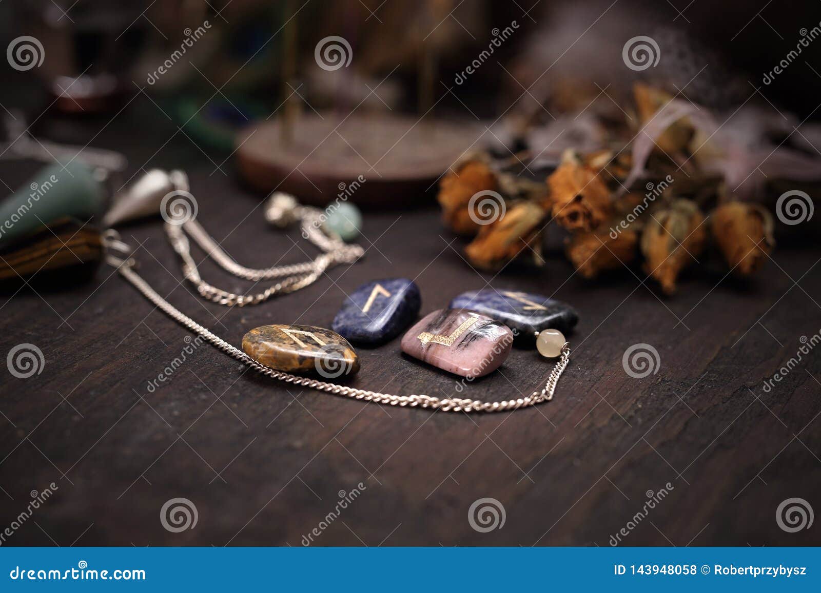 Amulets and Talismans, Stone Runes and a Crystal Pendulum. Stock Photo ...