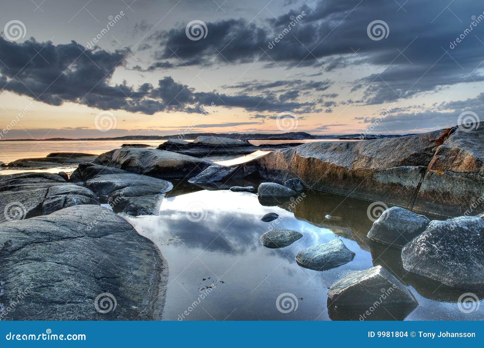 Amund Island stock photo. Image of night, ocean, stones - 9981804