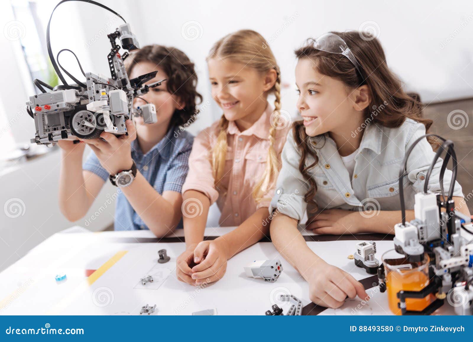 Amused Kids Exploring Modern Technologies at School Stock Photo - Image ...