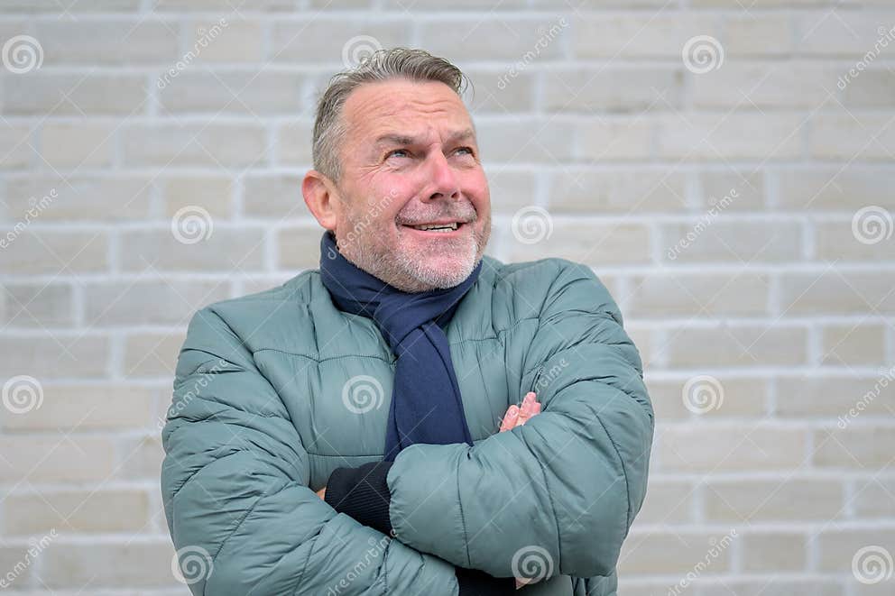 Amused Man Looking Upwards stock photo. Image of look - 349930448