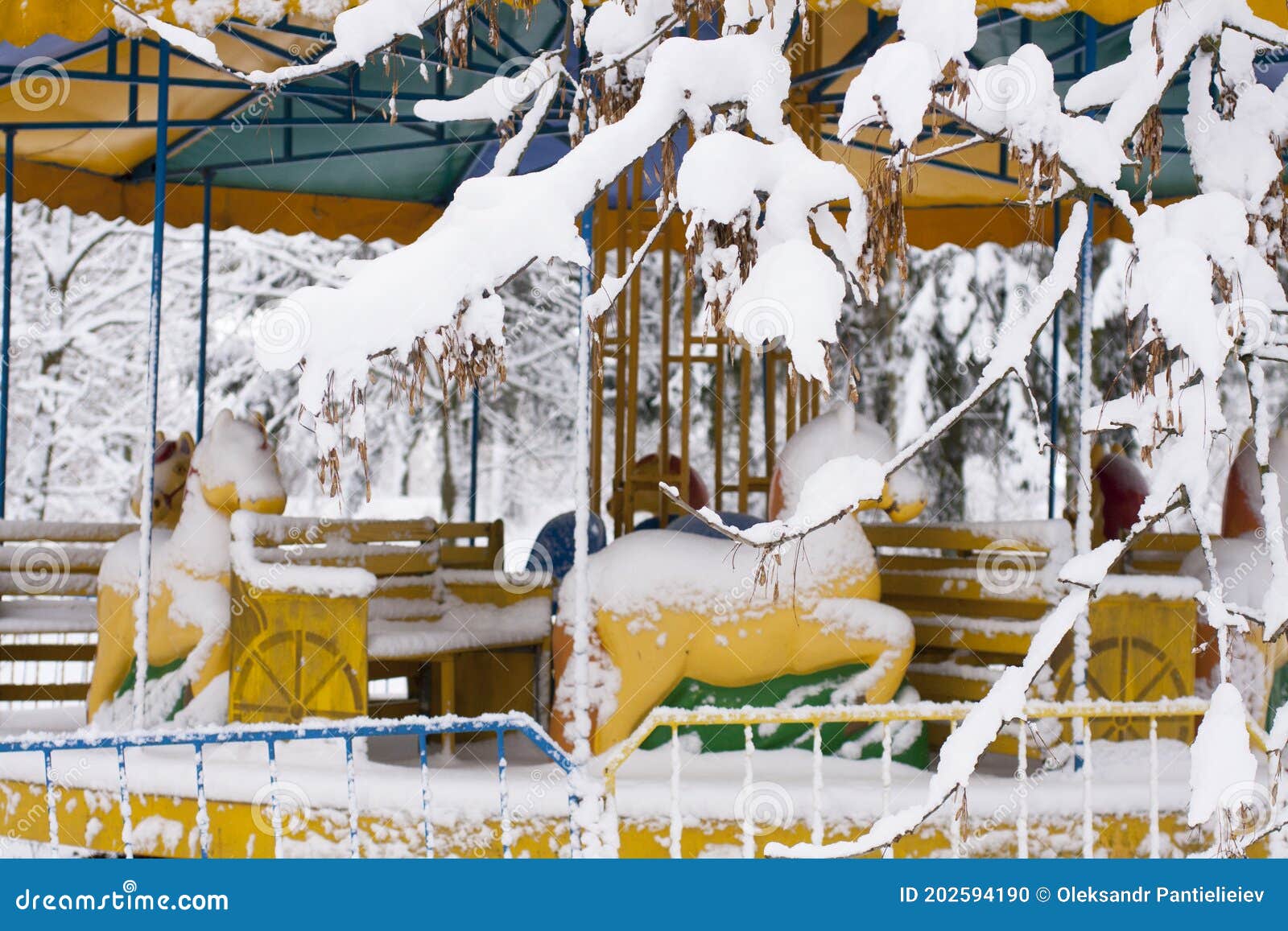 Amusement Park. Empty Carousel Covered with Snow Stock Photo - Image of ...
